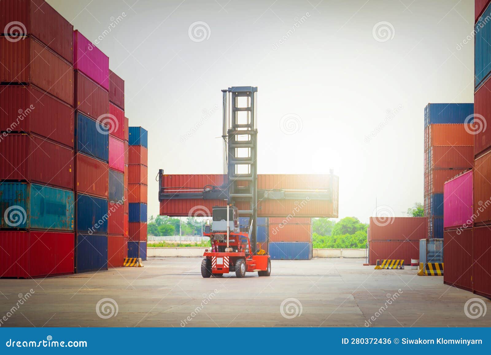 Container Crane Tractor Lifting Up Stacking Cargo Container. Freight ...