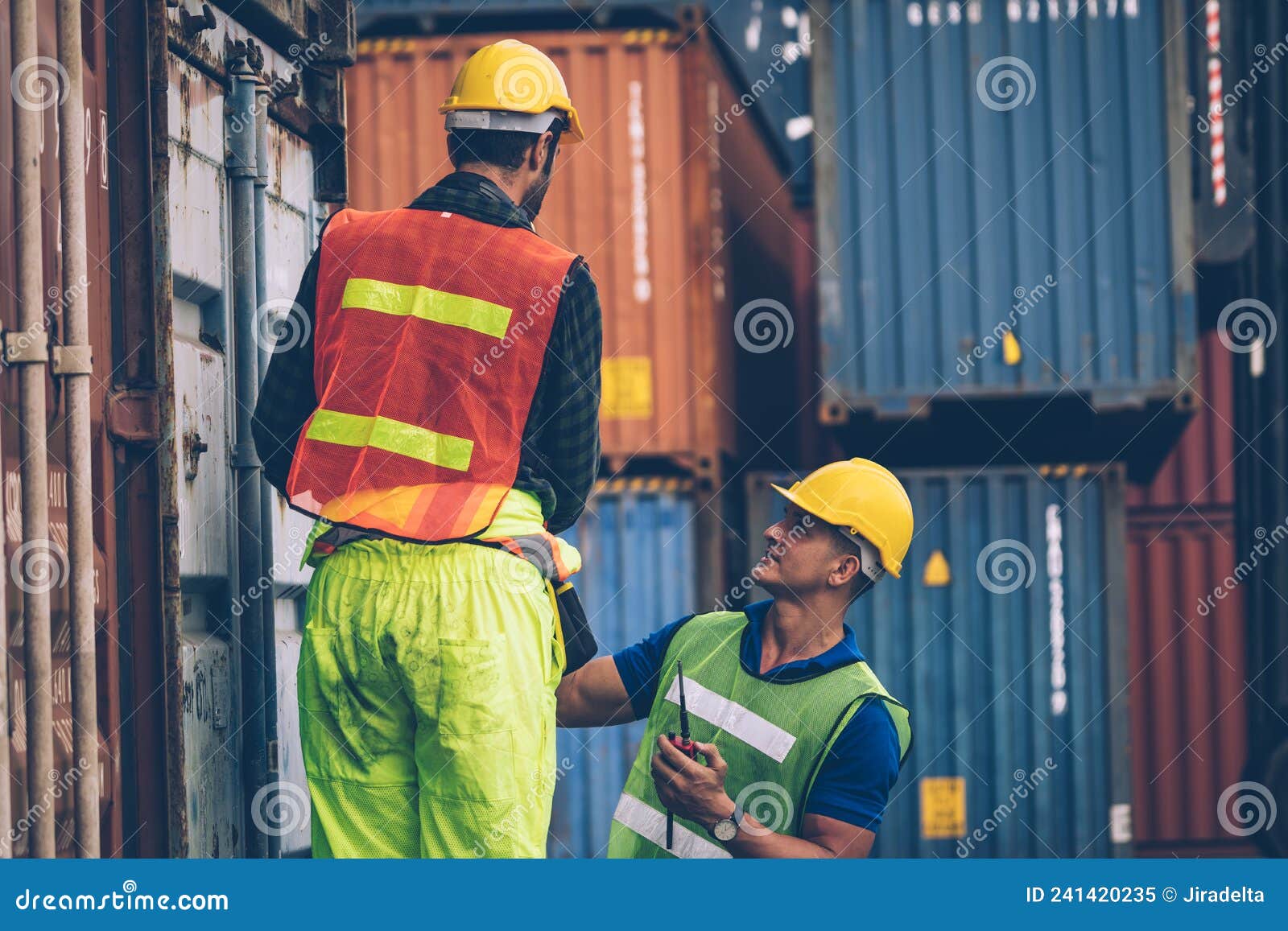 Container Depot Chief Talking with Foreman in Safety Vast and Safety ...