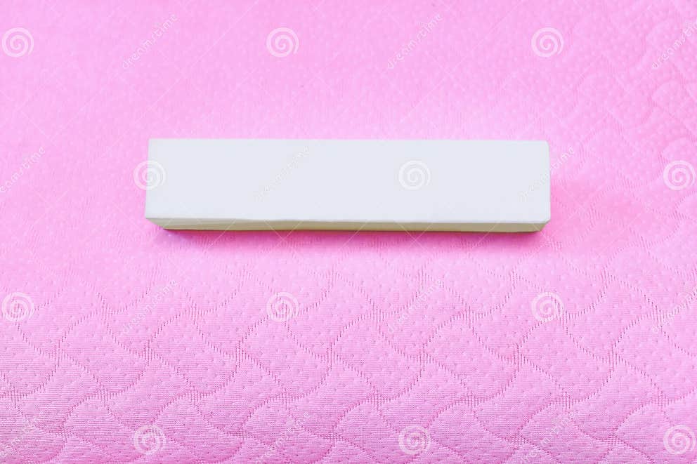 White Oblong Box on a Pink Gentle Fabric Textile Background Pillow ...