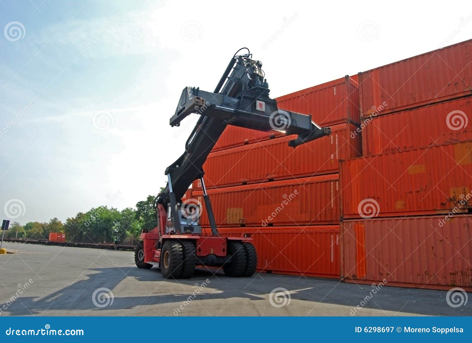 Forklift Hoisting Cargo And Shipping Containers Stock Photo ...