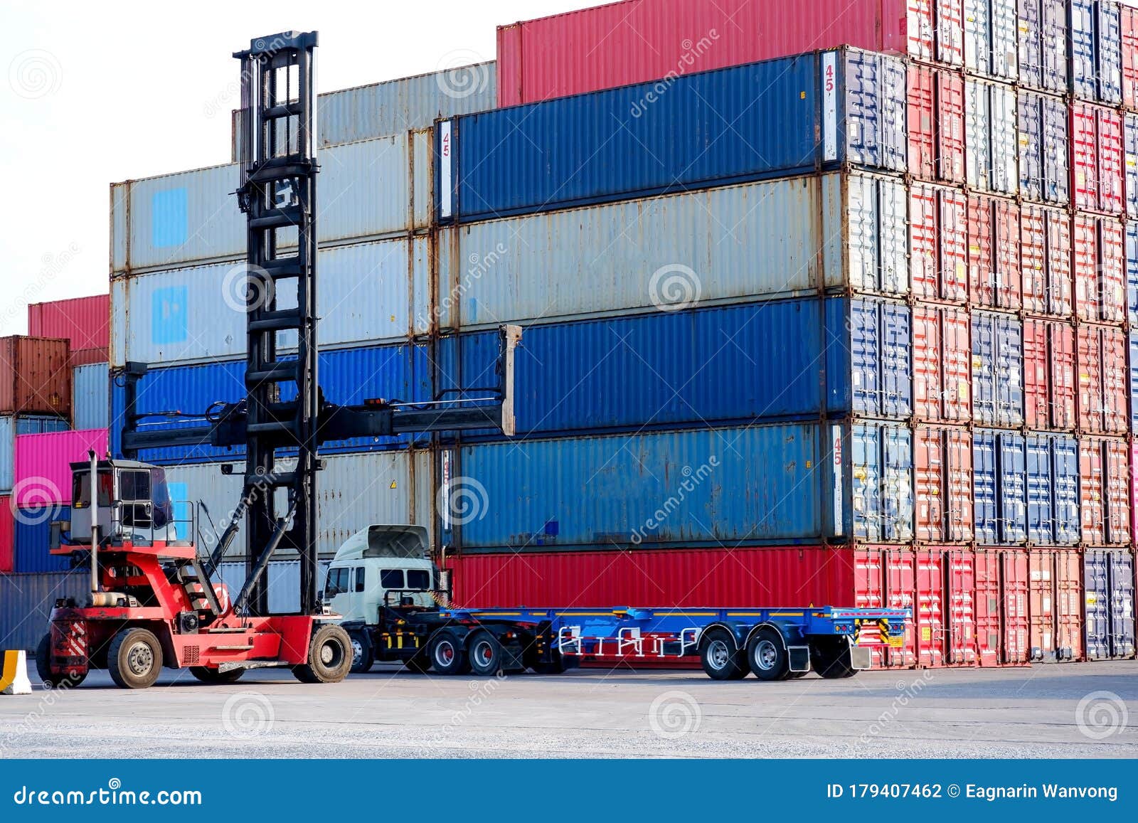 Container Forklift Trucks and Trucks in the Container Yard Stock Photo ...