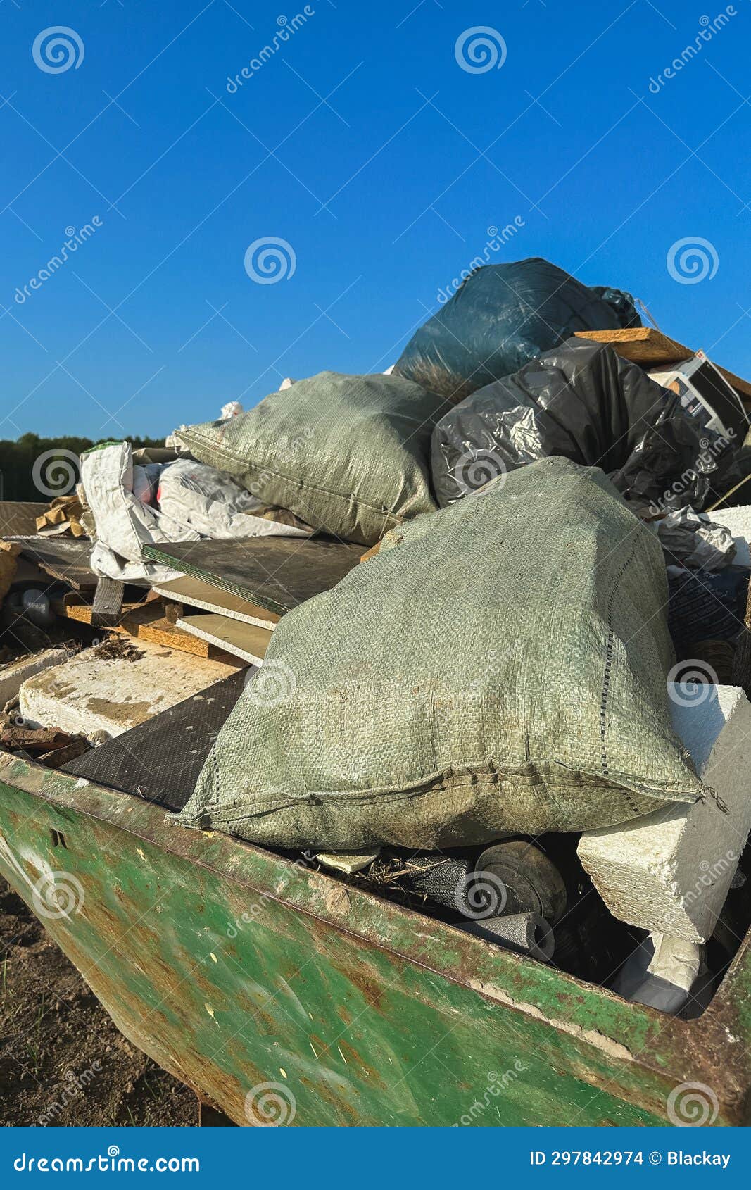 Container Full of Construction Waste and Debris on a Construction Site ...