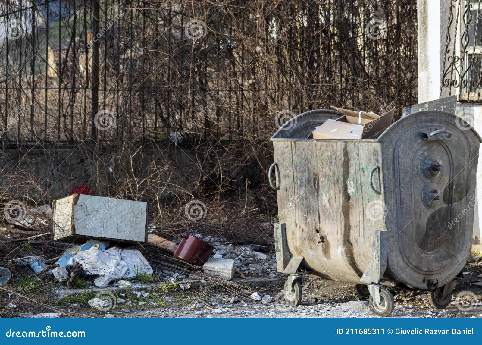 A Container Full of Garbage Near a Recycling Area Stock Image - Image ...