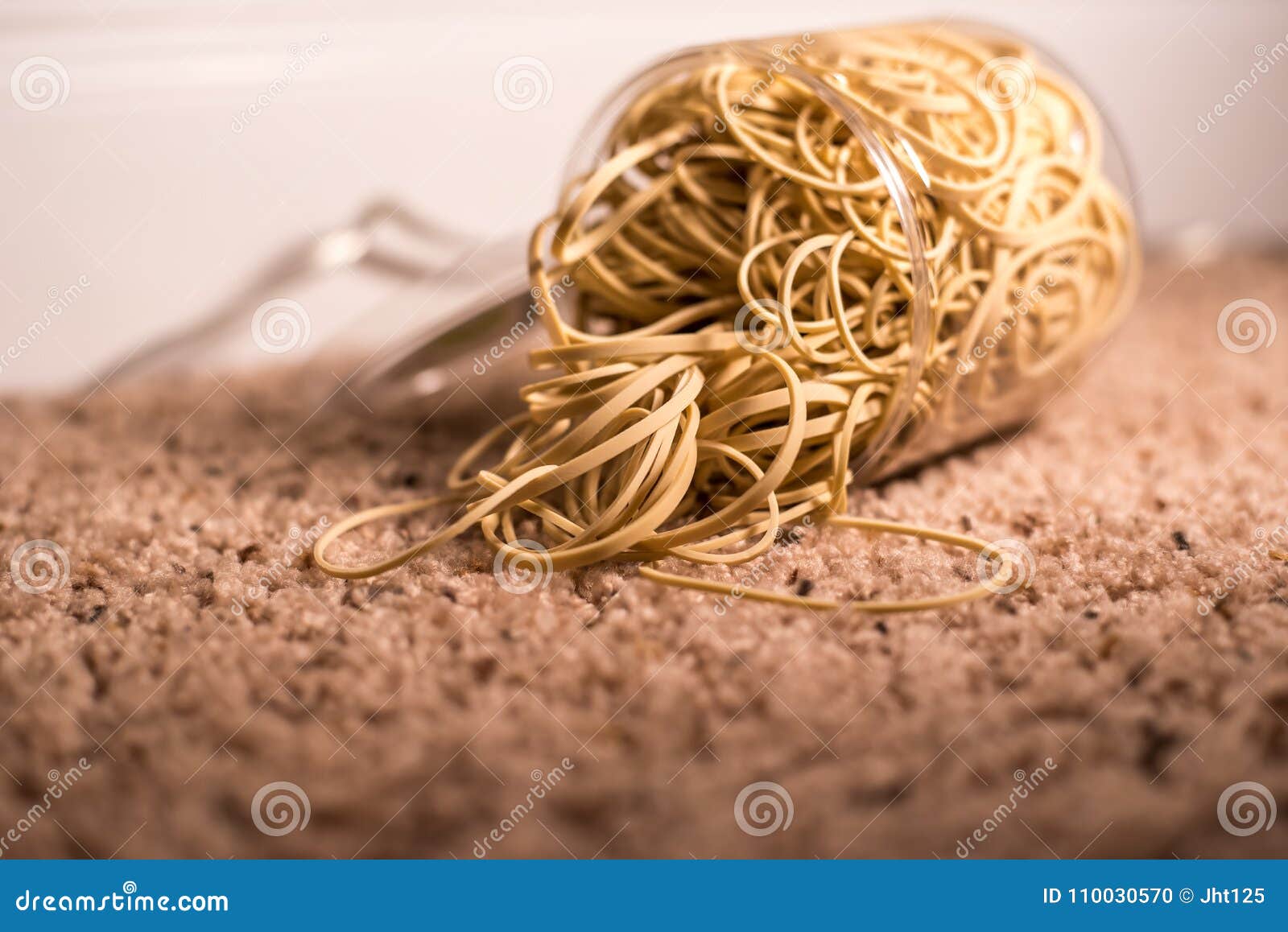 Container Full of Rubber Bands Stock Photo - Image of clear, heap ...
