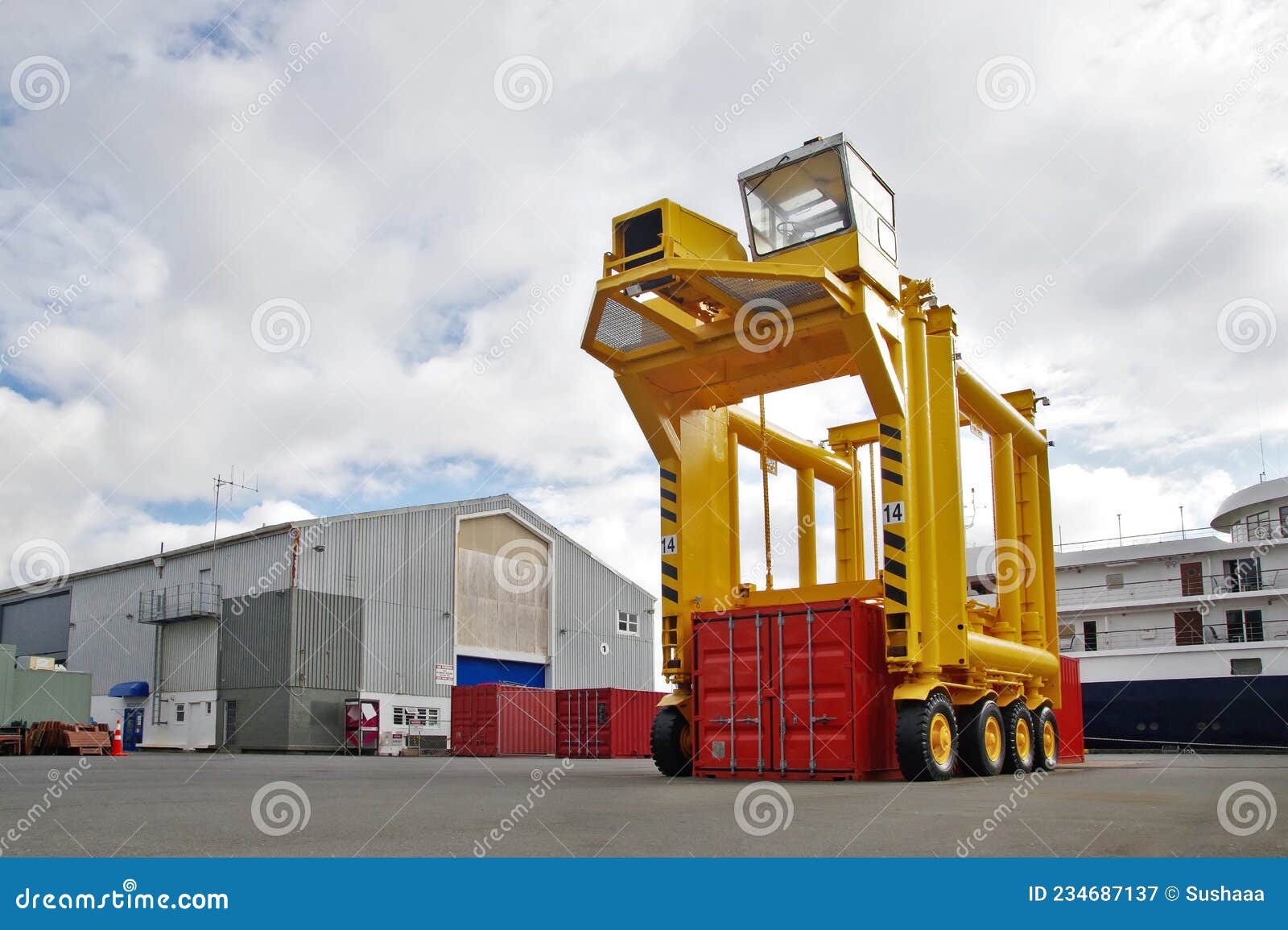Container Handler in the Port. Lifting the Shipping Container. Stock ...