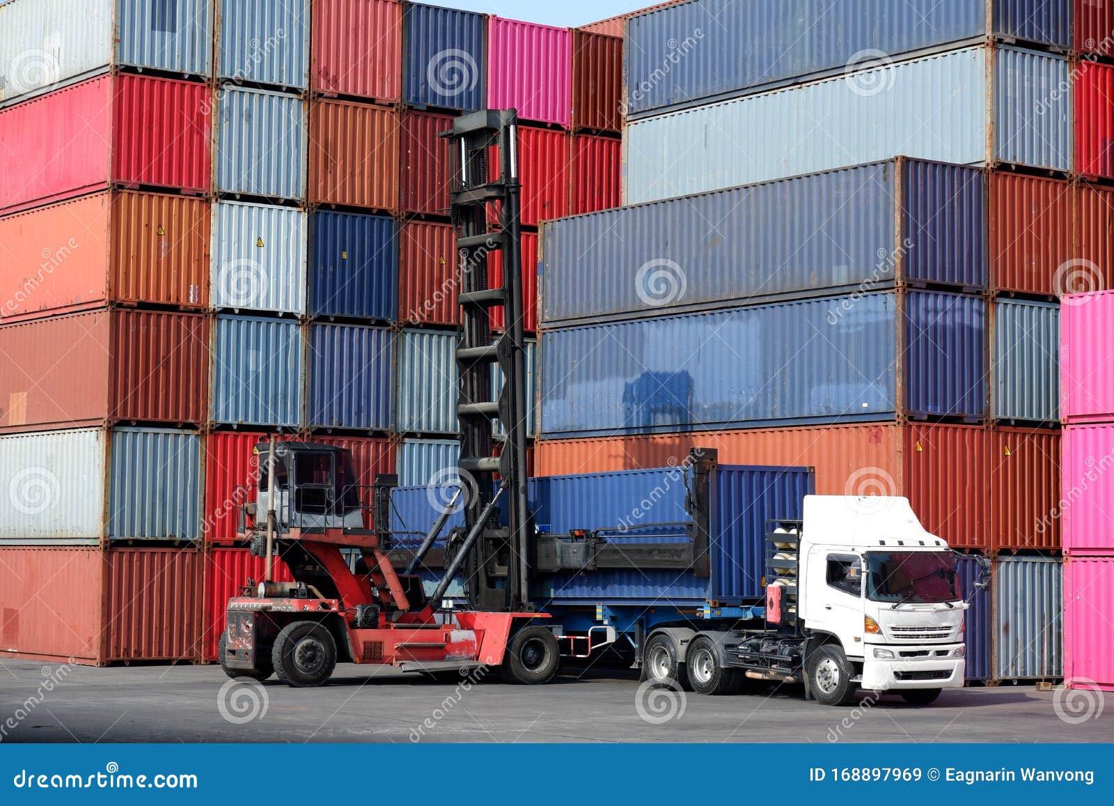 Container Handlers are Loading Containers into Trucks Stock Image ...