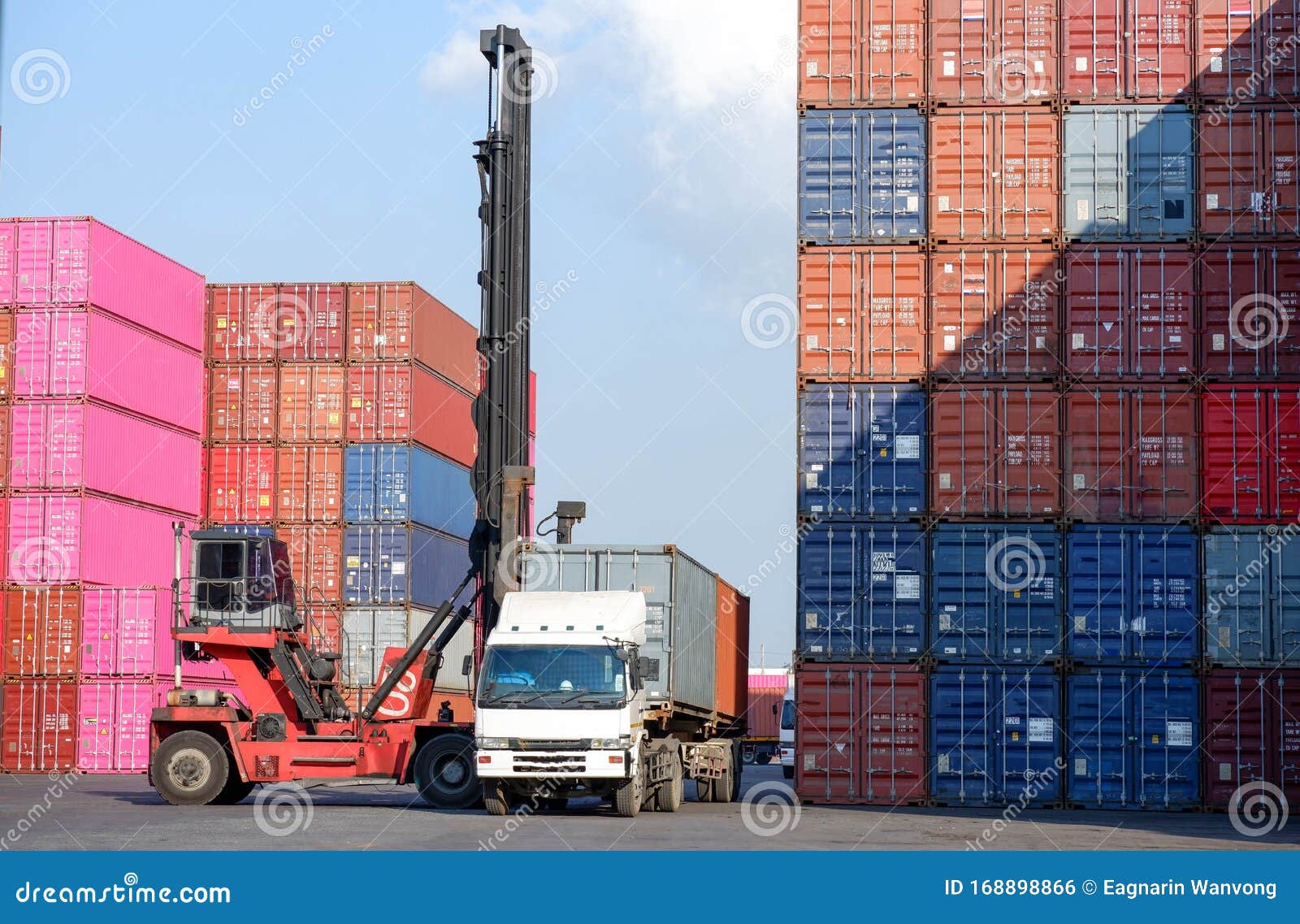 Container Handlers are Loading Containers into Trucks Stock Photo ...