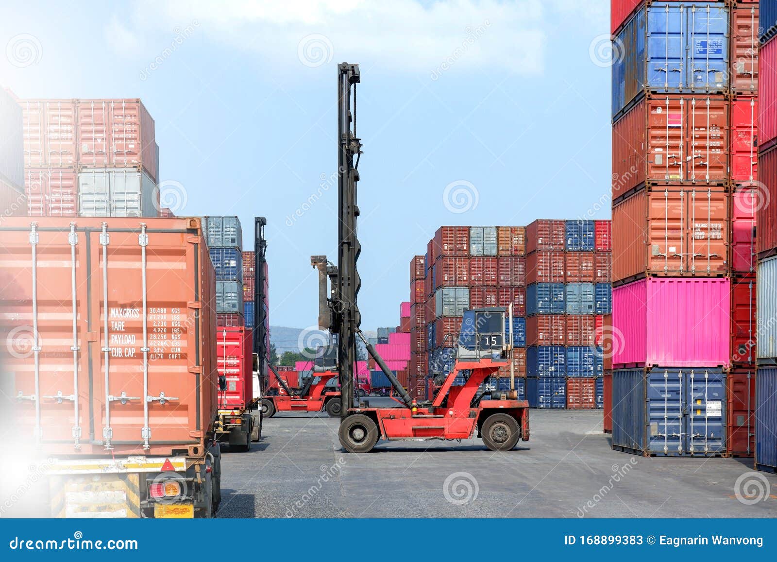 Container Stacker, Load the Container into the Truck. Transportation ...