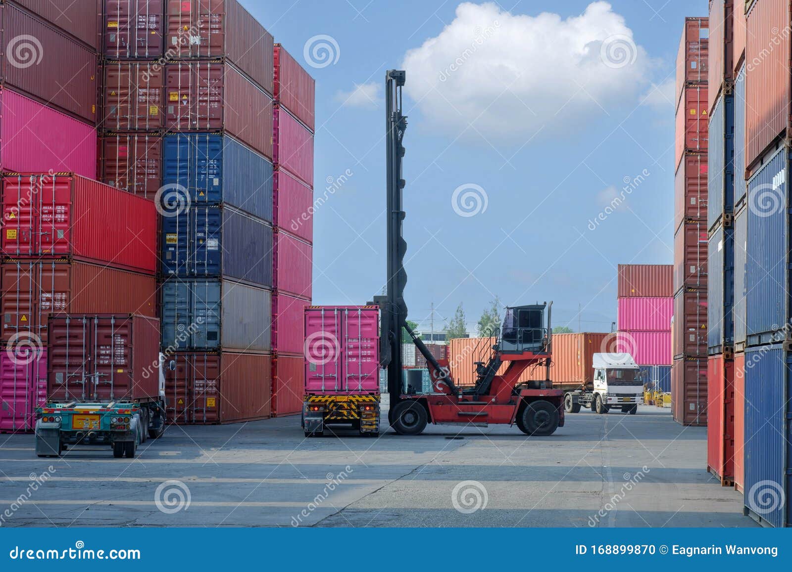 Container Handlers are Loading Containers into Trucks Stock Photo ...