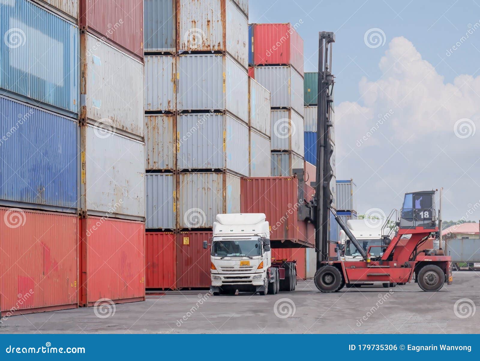 Container Handlers Loading Containers into Trucks Stock Photo - Image ...