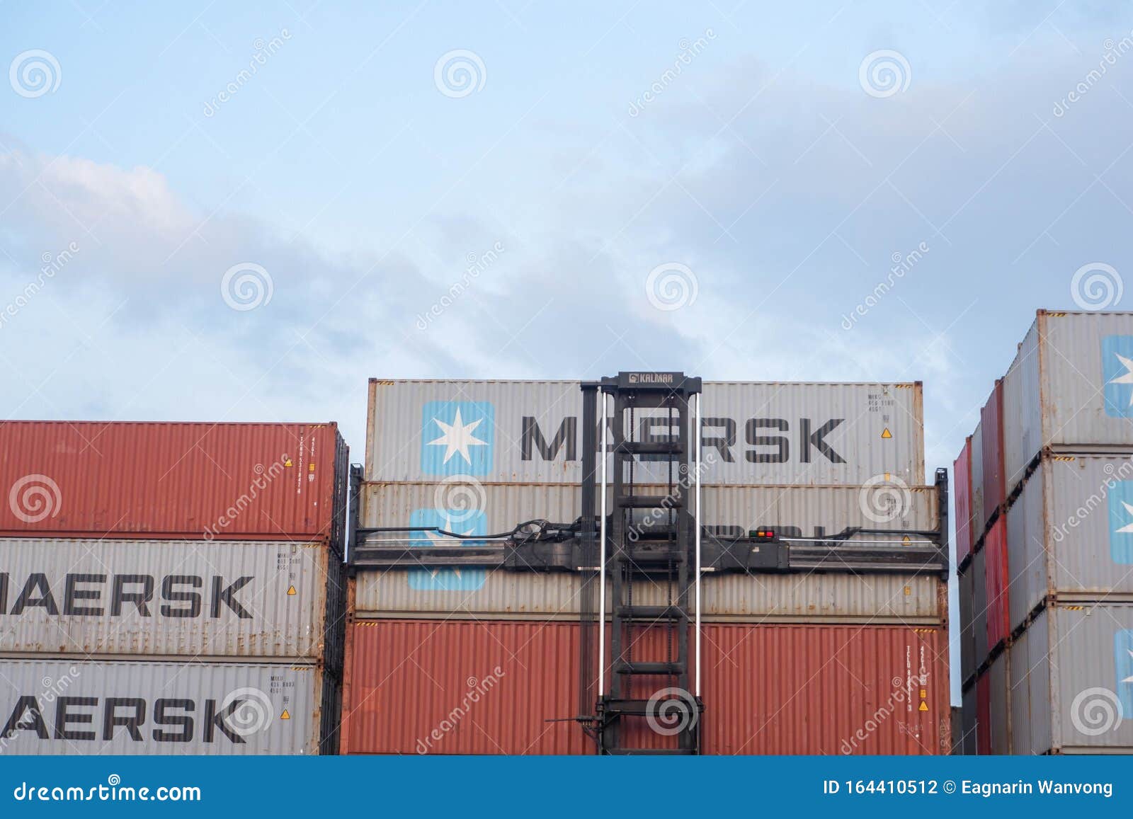 Container Handlers in the Shipping Dock with Storage Cabinet Background ...