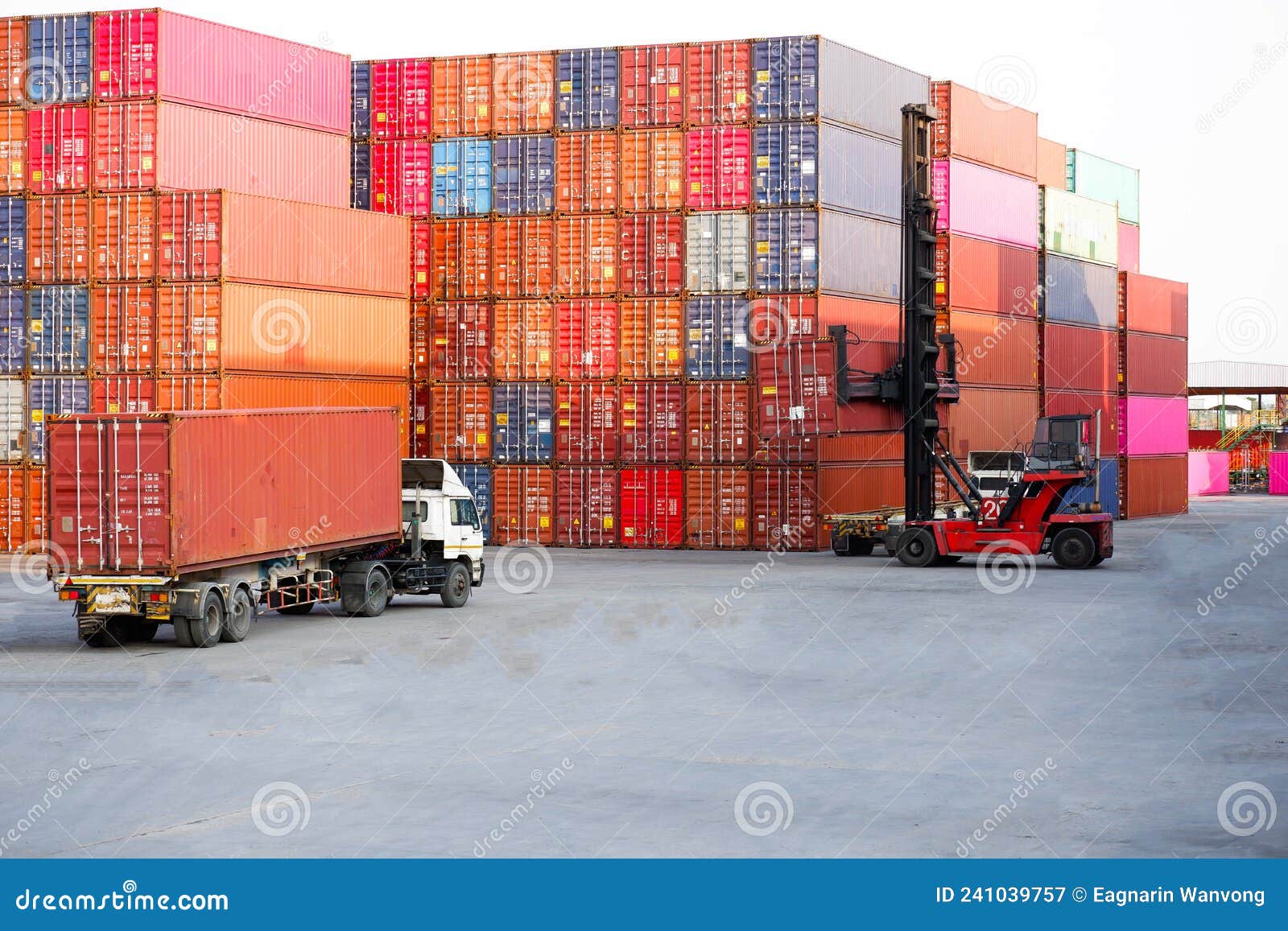 Container Handlers and Trucks in the Loading and Unloading Yard Stock ...
