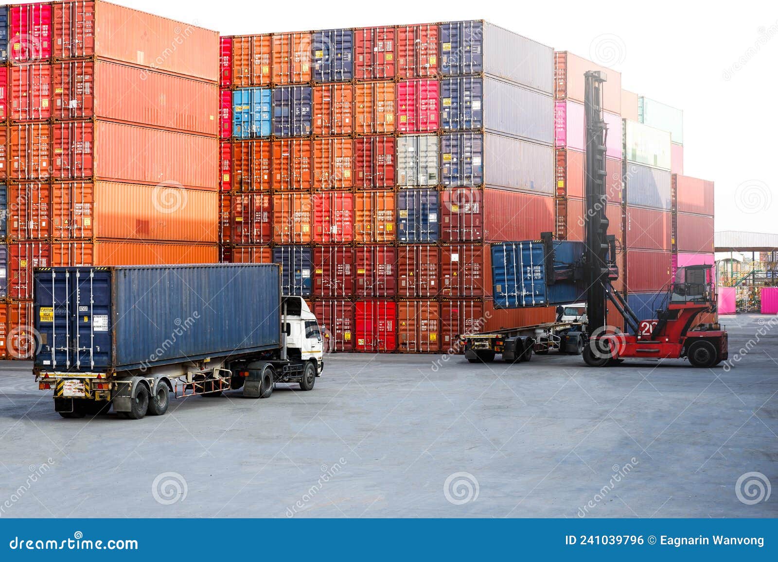 Container Handlers and Trucks in the Loading and Unloading Yard Stock ...