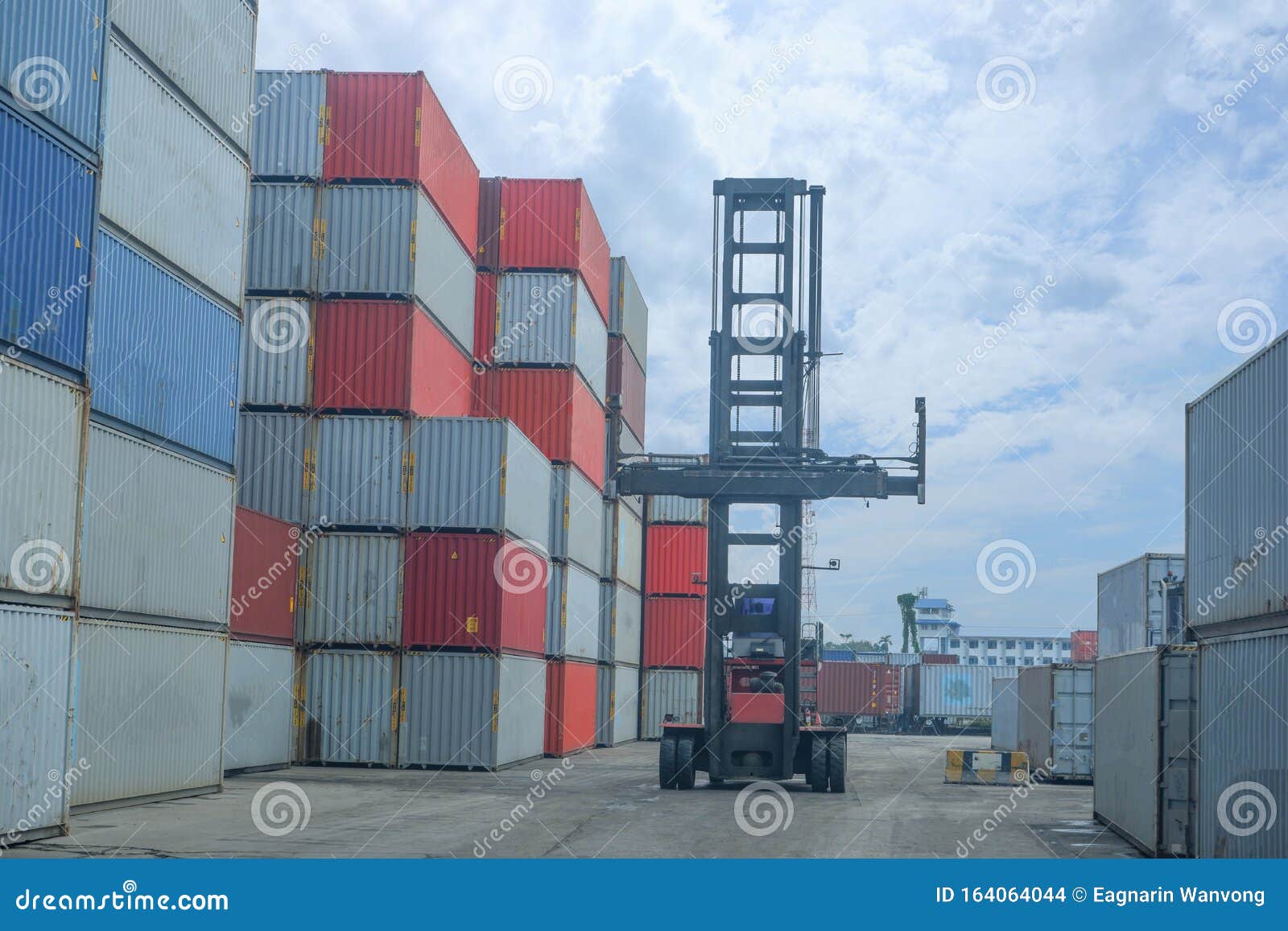 Container Handlers Working in a Harbor Stock Photo - Image of lifting ...