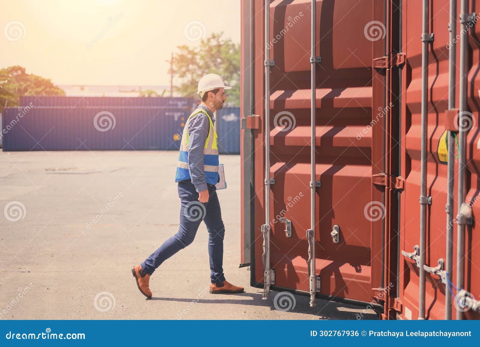 Container Logistic Operators Workers Wearing Yellow Helmets and ...