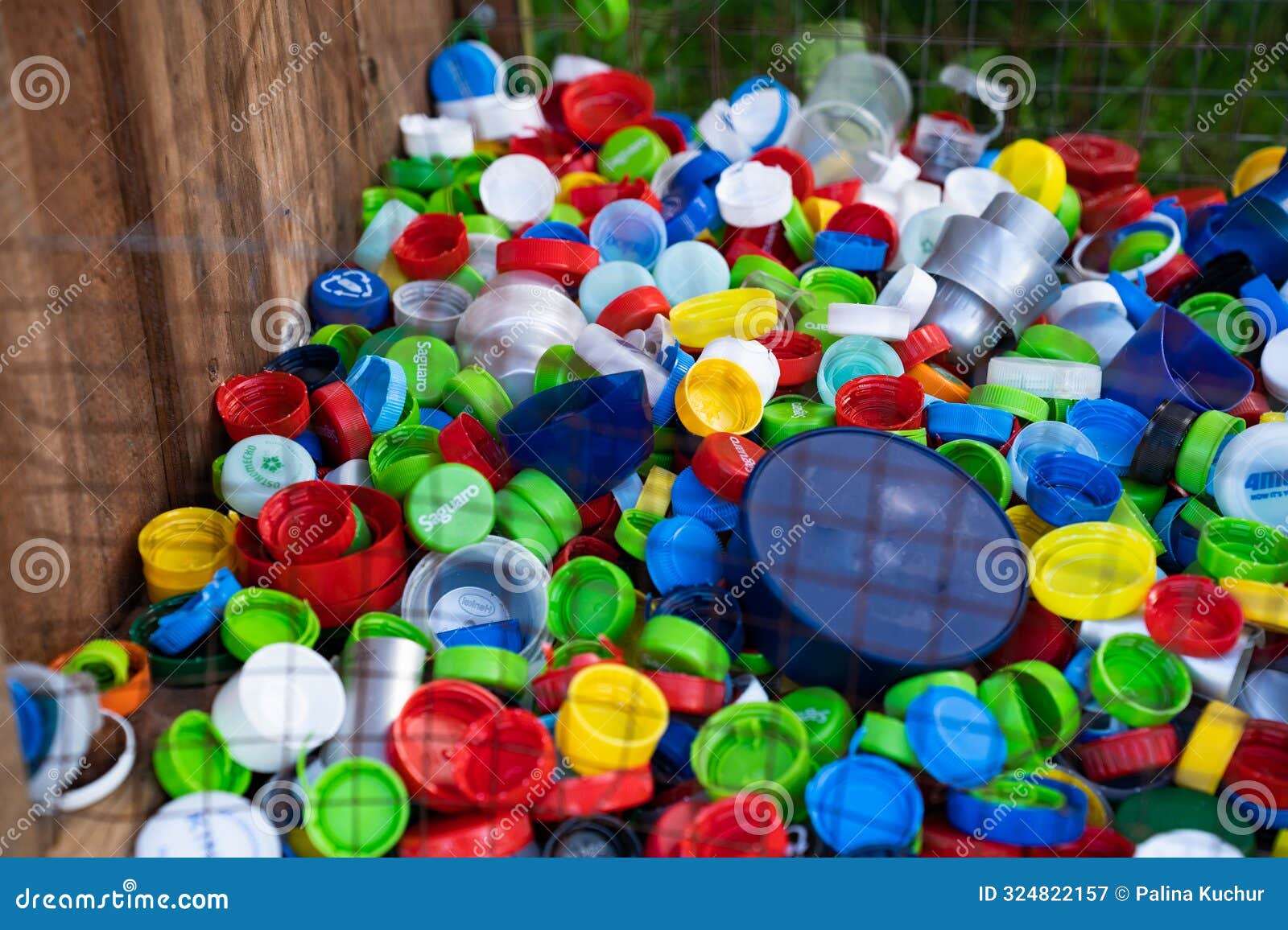 Container with Plastic Bottle Caps Stock Image - Image of reduction ...