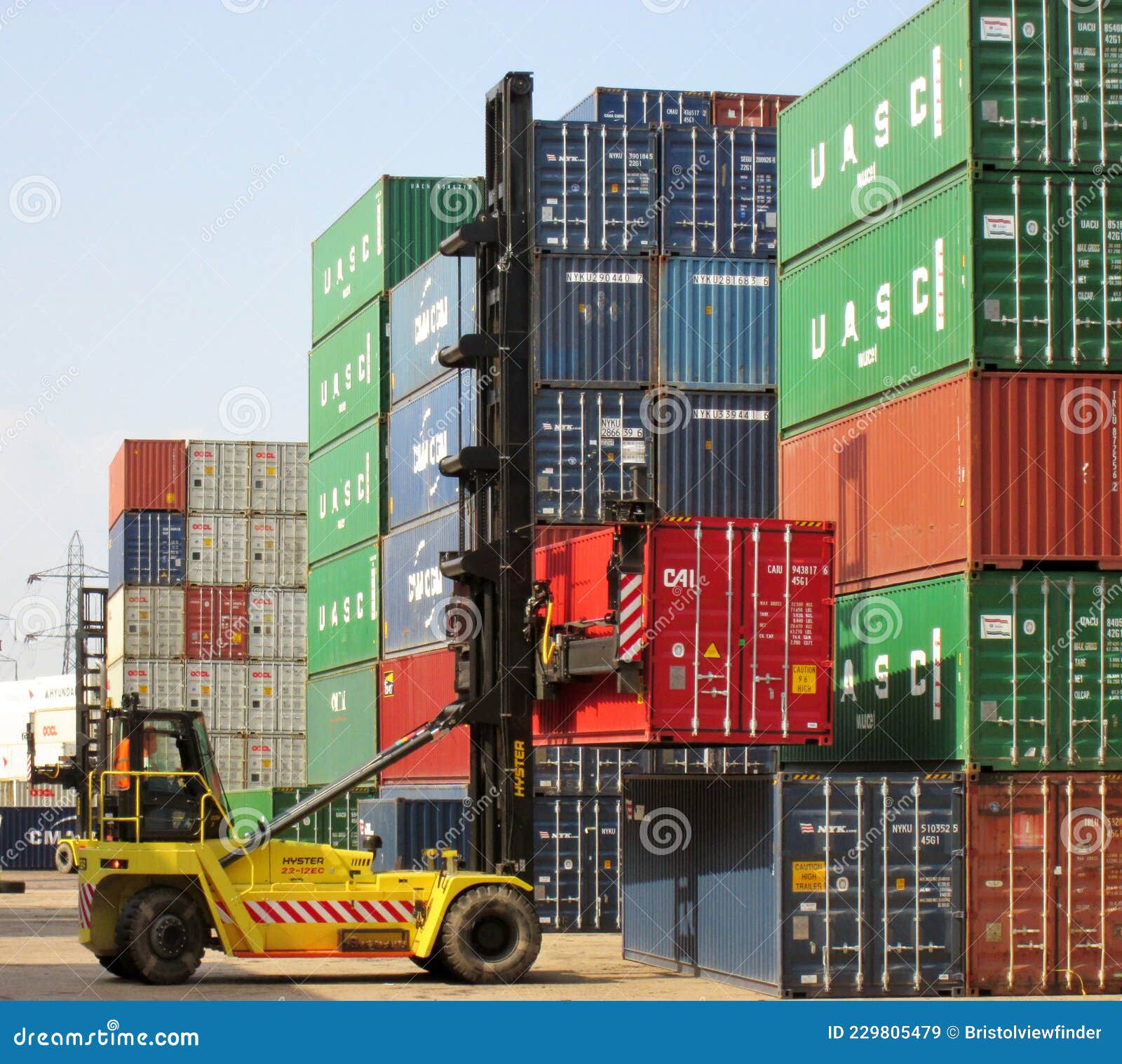 Container Reach Stacker Moving Containers Around at Southampton Docks ...