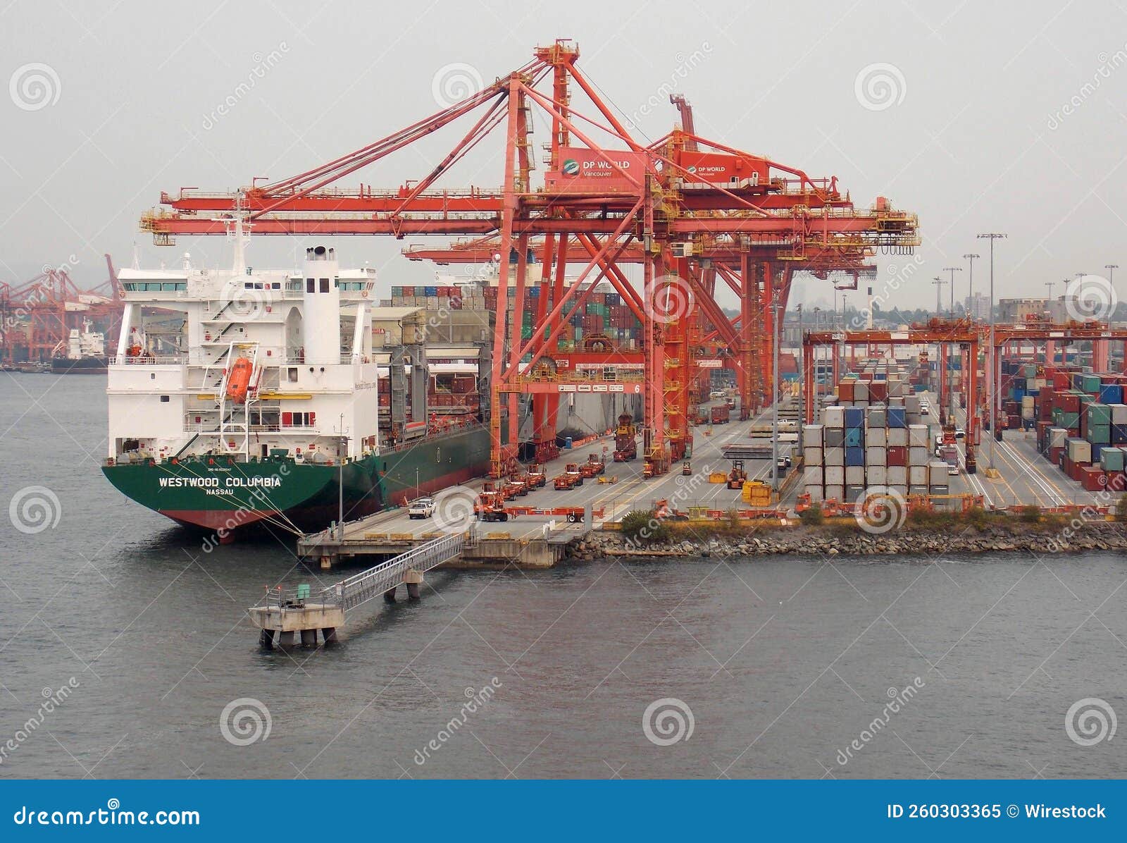 Container Ship Being Loaded at a Shipyard in Vancouver, Canada on a ...