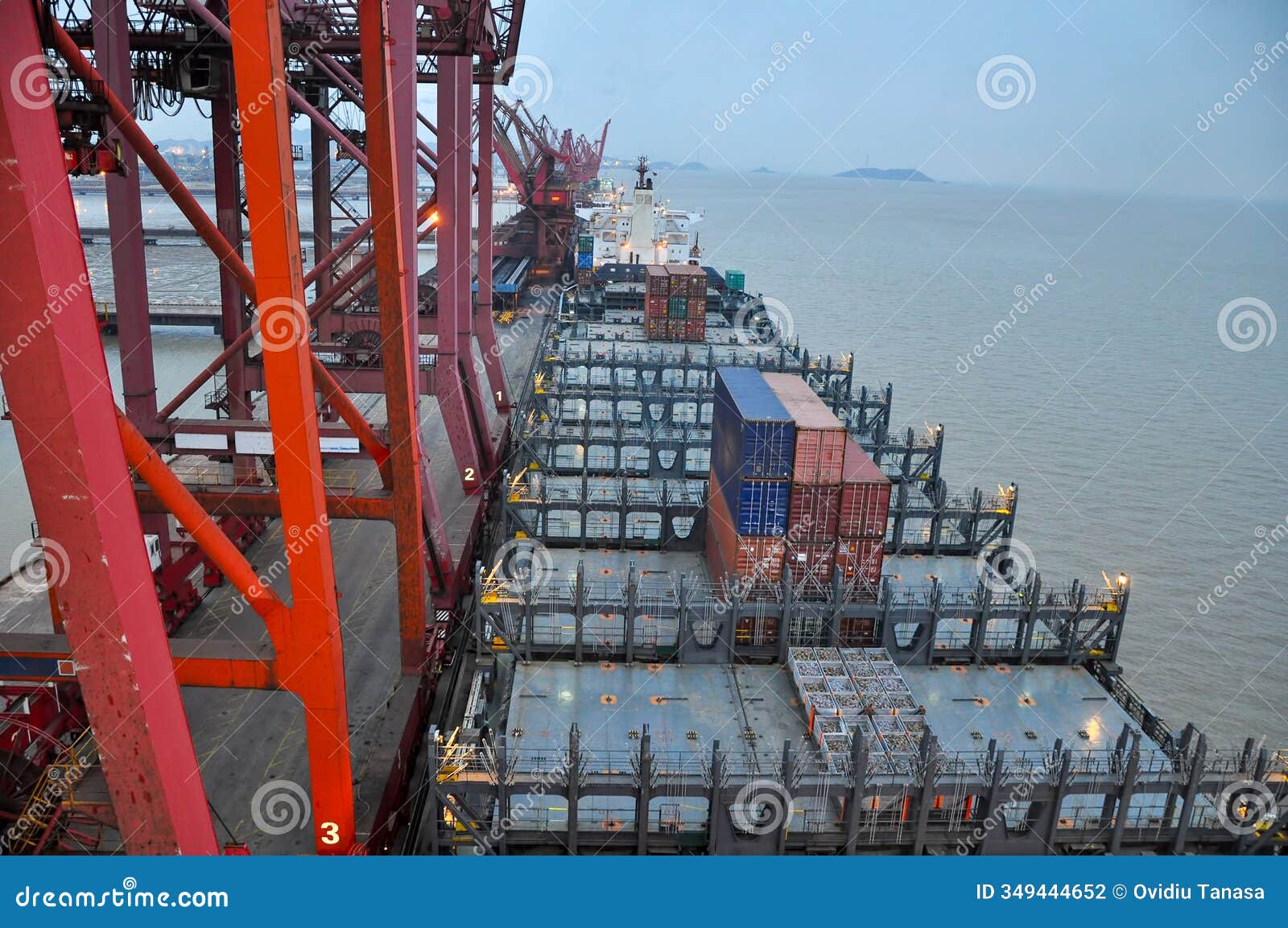 Container Ship Docking at Large Industrial Port with Cranes Stock Photo ...