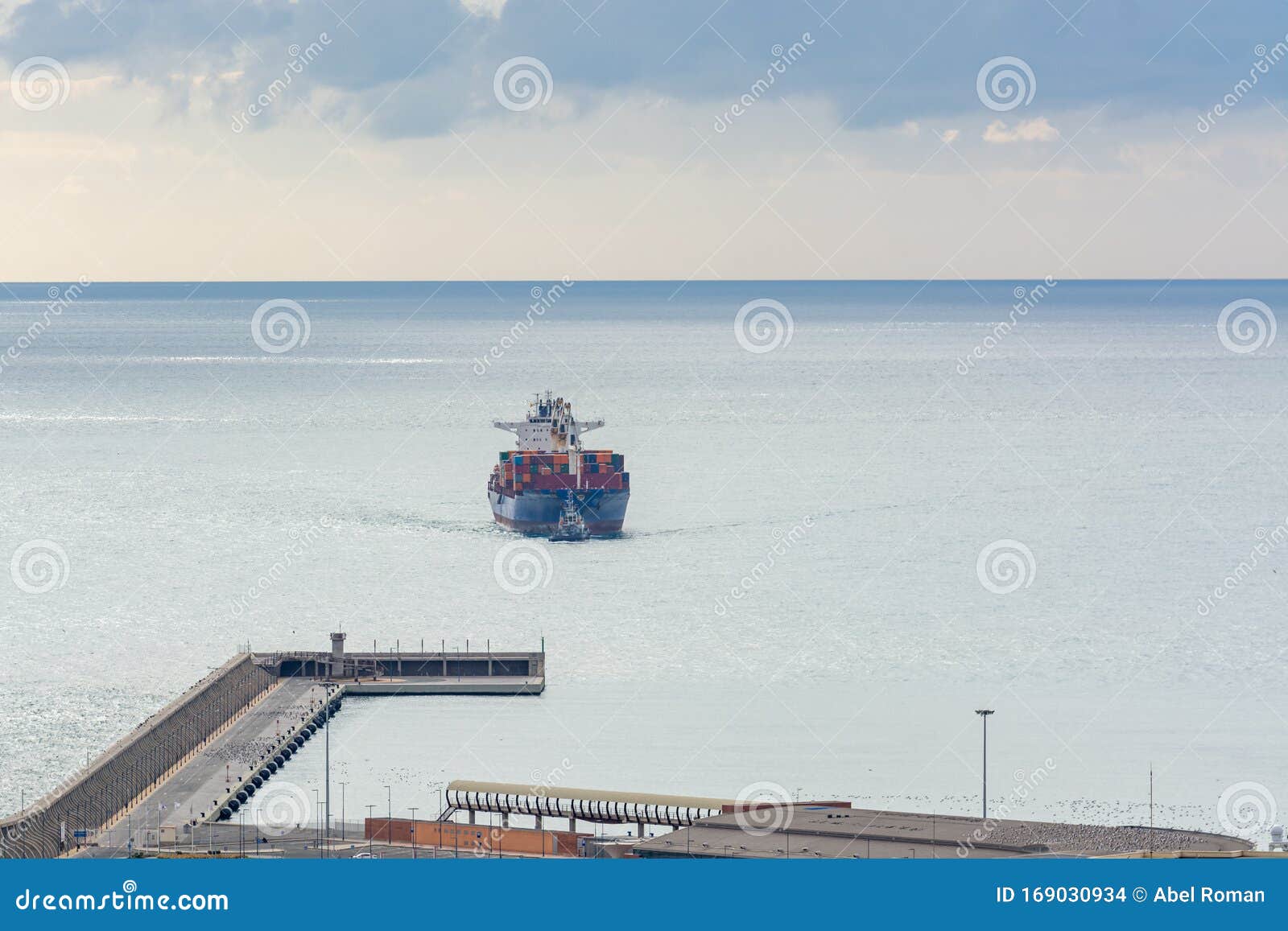 Container Ship Fully Loaded in the Sea Approaching the Port Editorial ...
