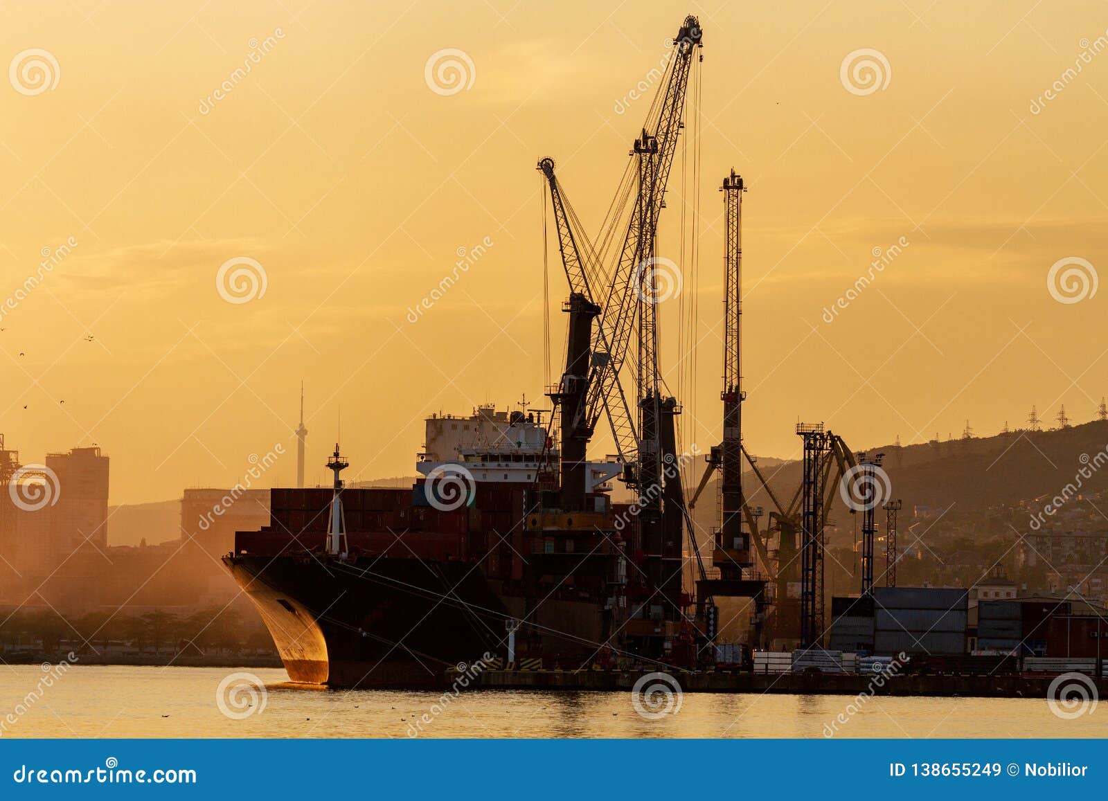 Container Ship is Loading in a Port, Evening Light Stock Image - Image ...