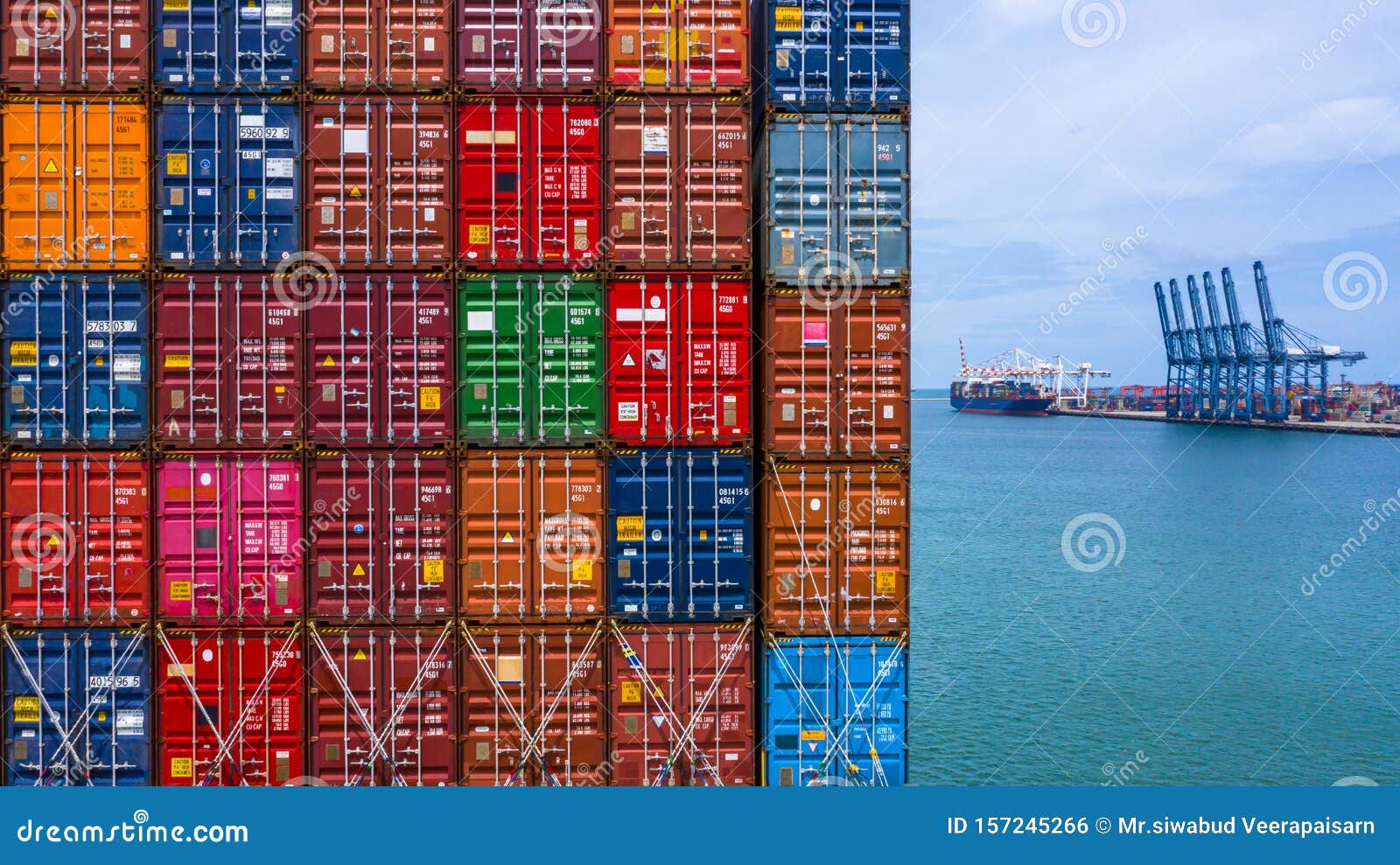 Container Ship Loading and Unloading in Deep Sea Port, Aerial Top View ...