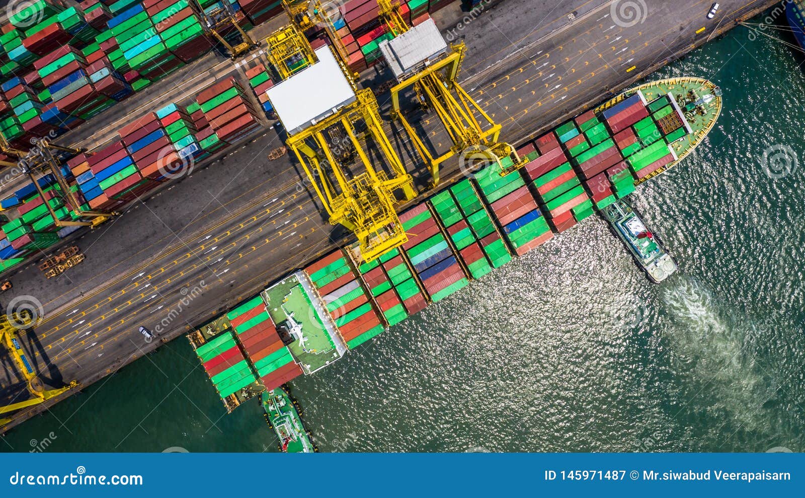 Container Ship Loading and Unloading in Deep Sea Port, Aerial Top View ...