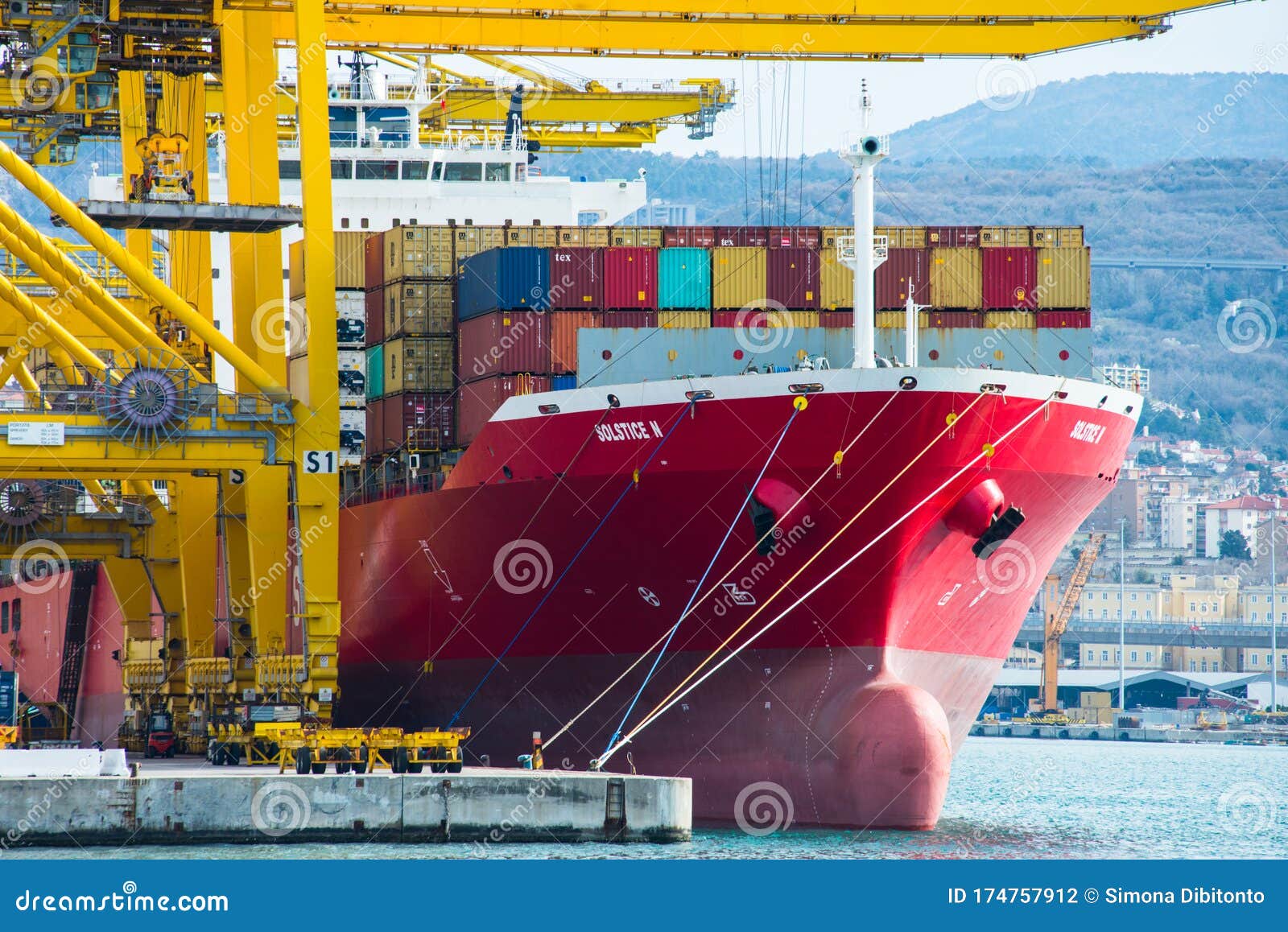 Container Ship Moored in the Trieste`s Harbor, Loading Containers ...