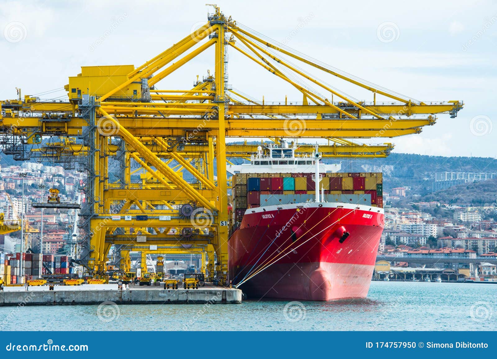 Container Ship Moored In The Trieste`s Harbor, Loading Containers Stock ...