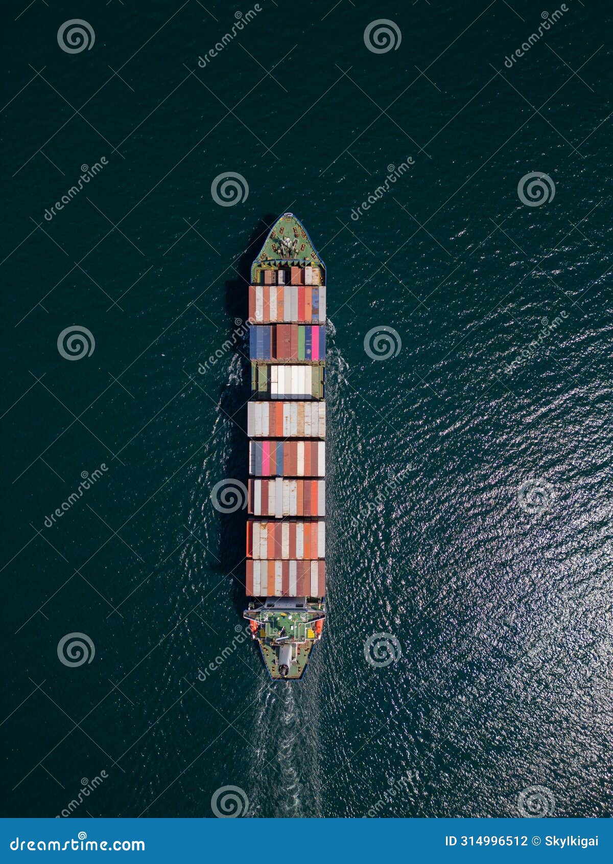 A Container Ship Moves Steadily through the Ocean, Carrying Stacked ...
