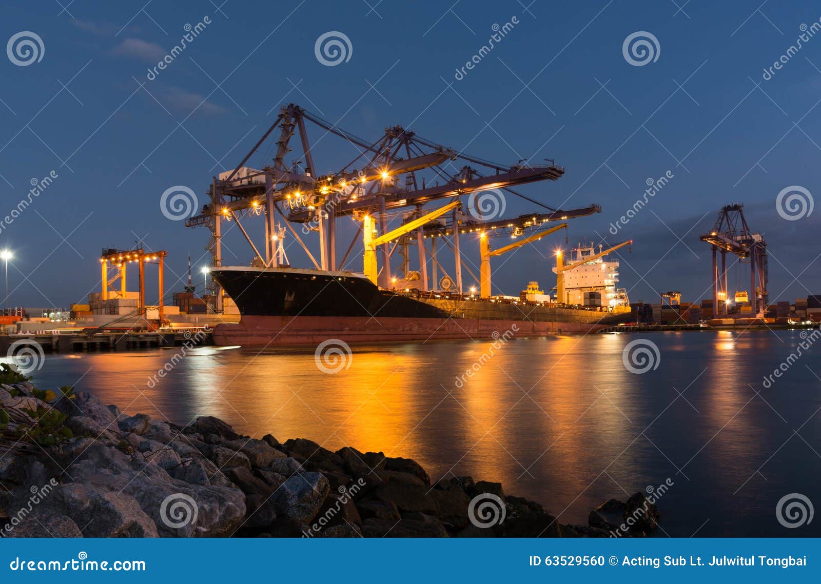 The Container Ship in Port during Loading Container into Ship Stock ...