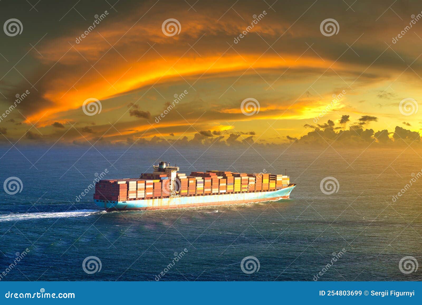 Container ship at sunset stock image. Image of heavy - 254803699