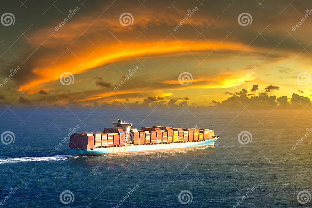 Container ship at sunset stock image. Image of heavy - 254803699