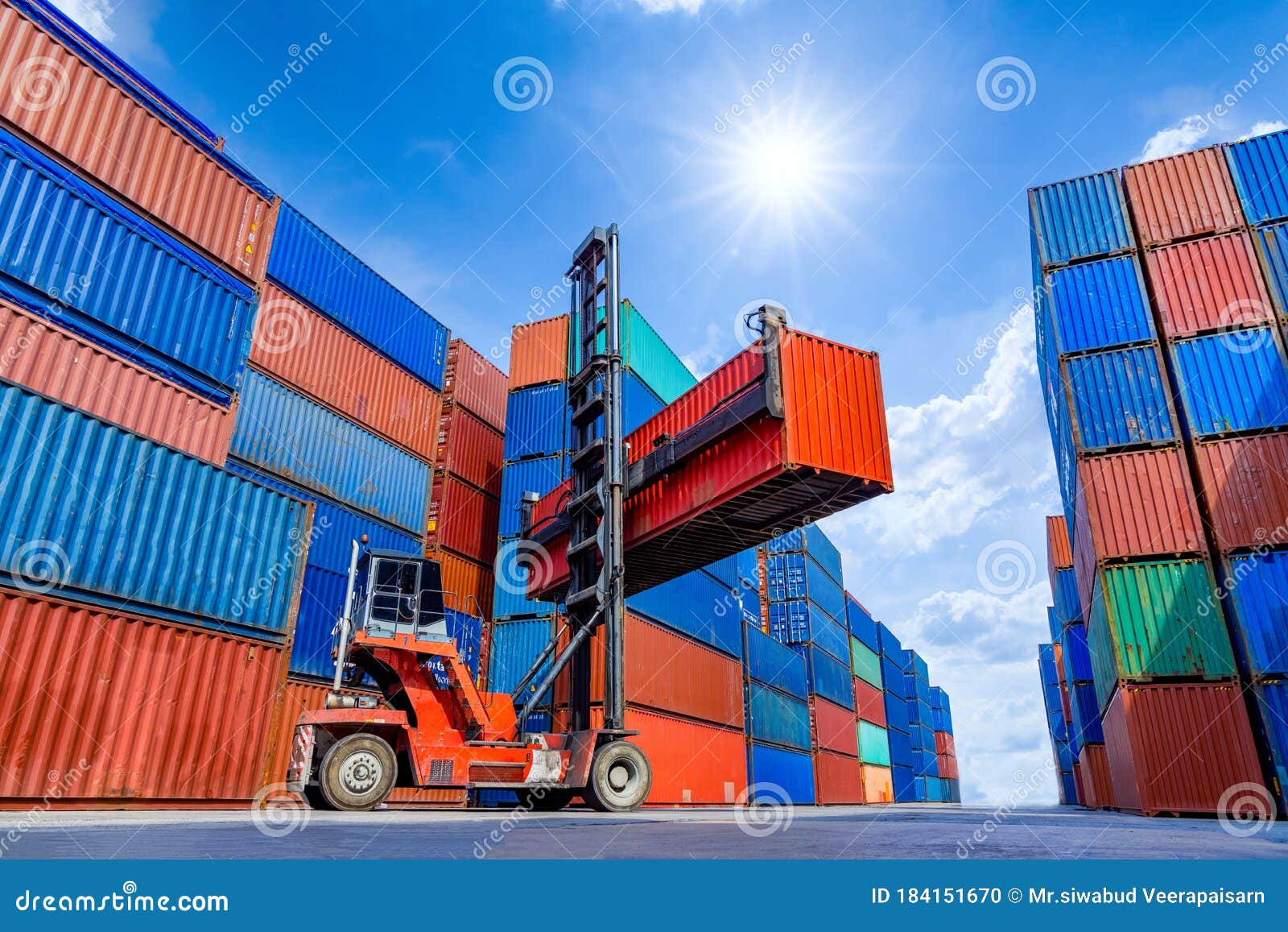 Container Stacker Crane Lifting Up Stacking Container Box in Yard ...