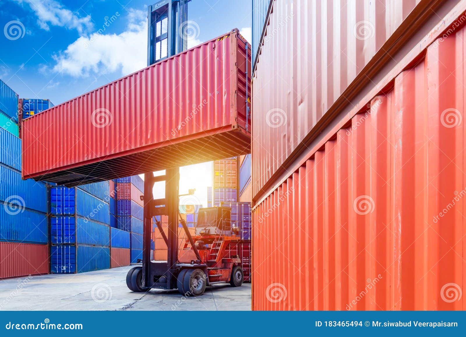 Container Stacker Crane Lifting Up Stacking Container Box in Yard ...