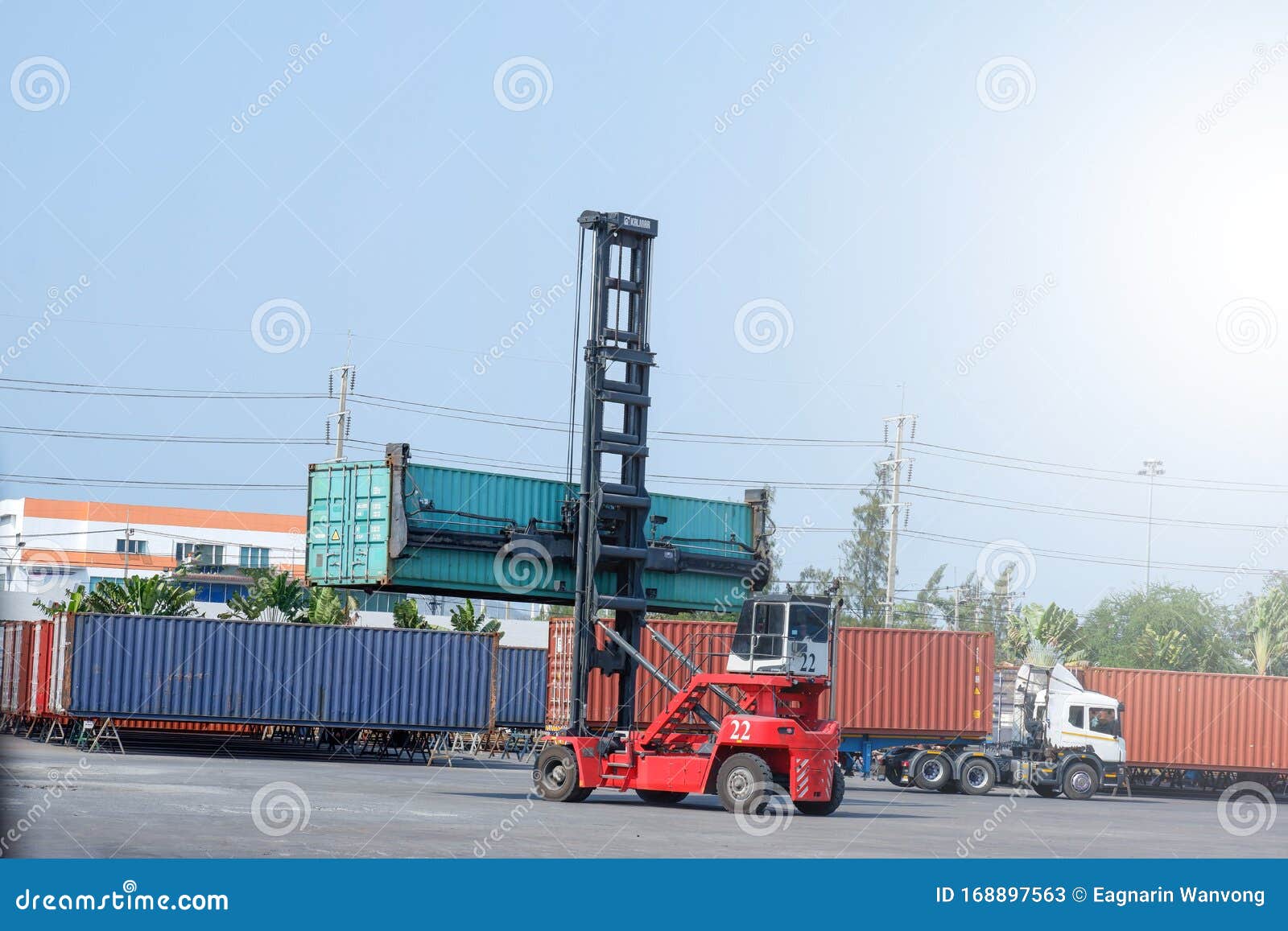 Container Handlers are Loading Containers into Trucks Stock Image ...