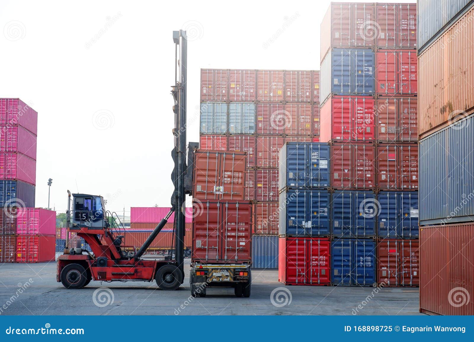 Container Handlers are Loading Containers into Trucks Stock Image ...