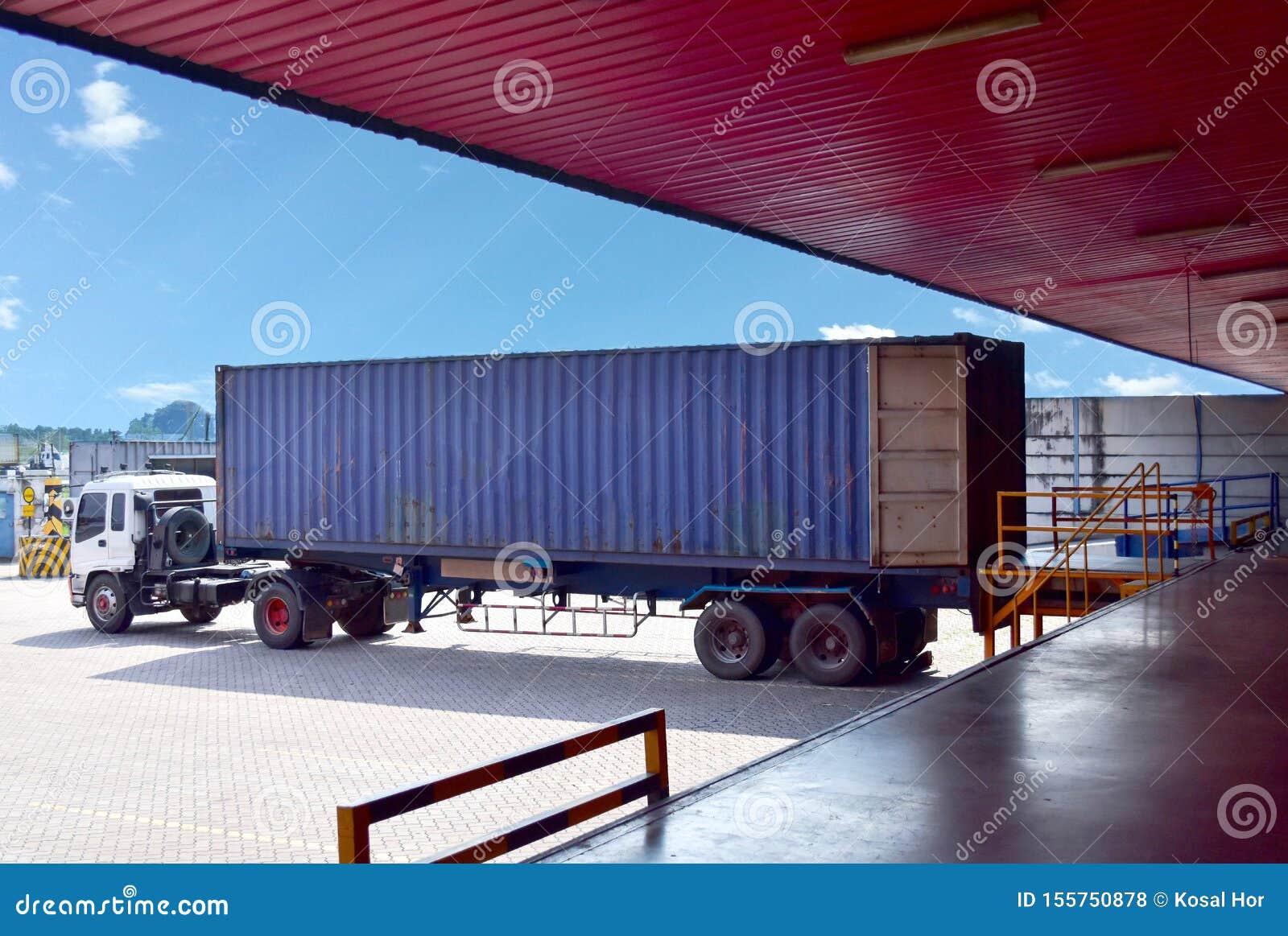 Container Truck Align With Dock Leveller At Distribution Warehouse For ...