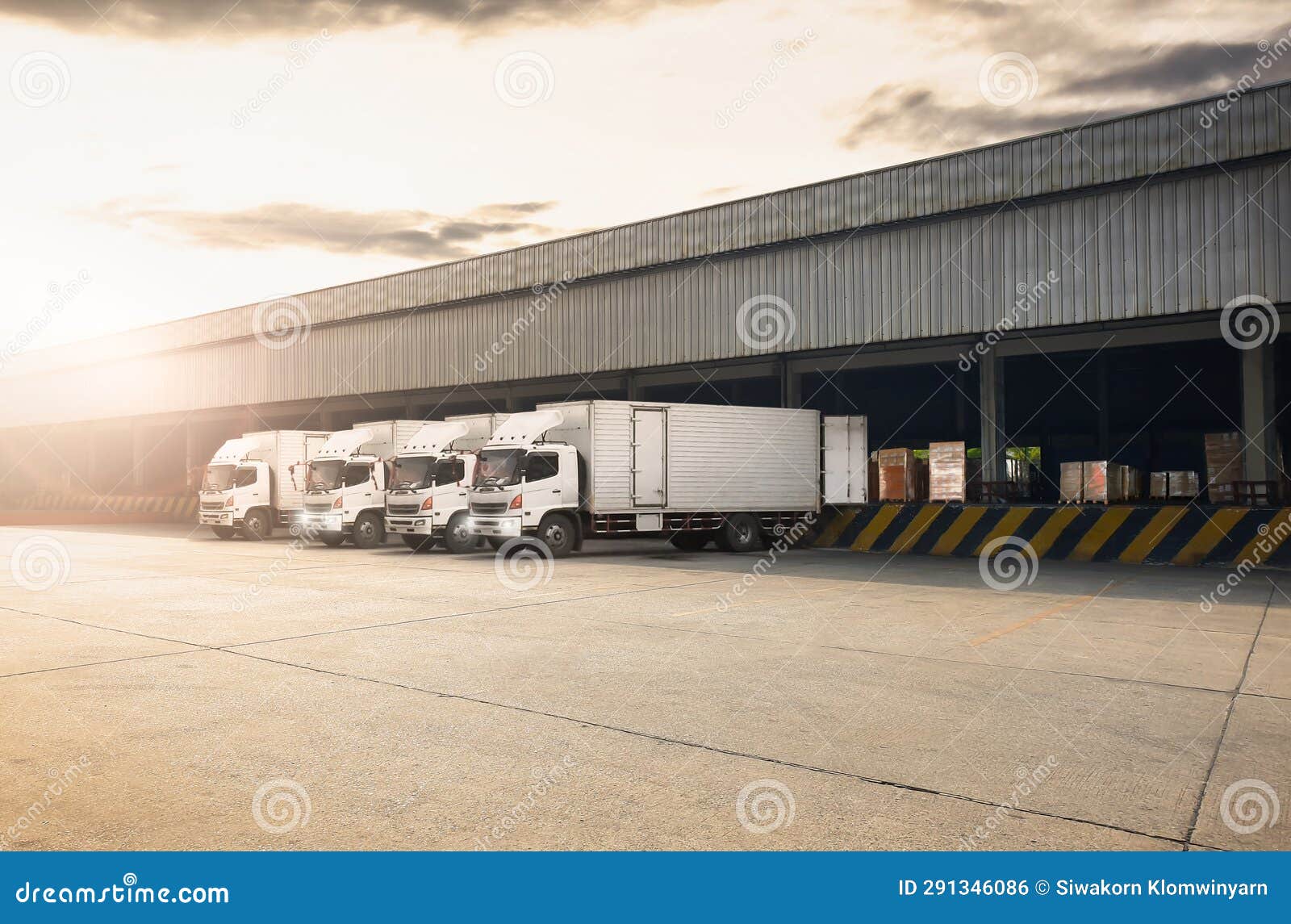 Container Trucks Parked Loading Package Boxes at Dock Warehouse Dock ...