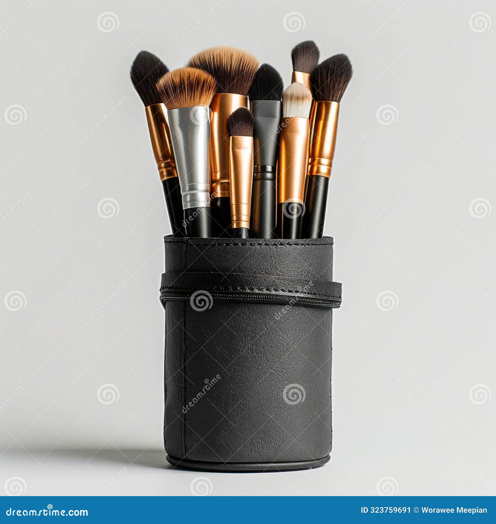 A Container with a Variety of Makeup Brushes Inside Stock Image - Image ...