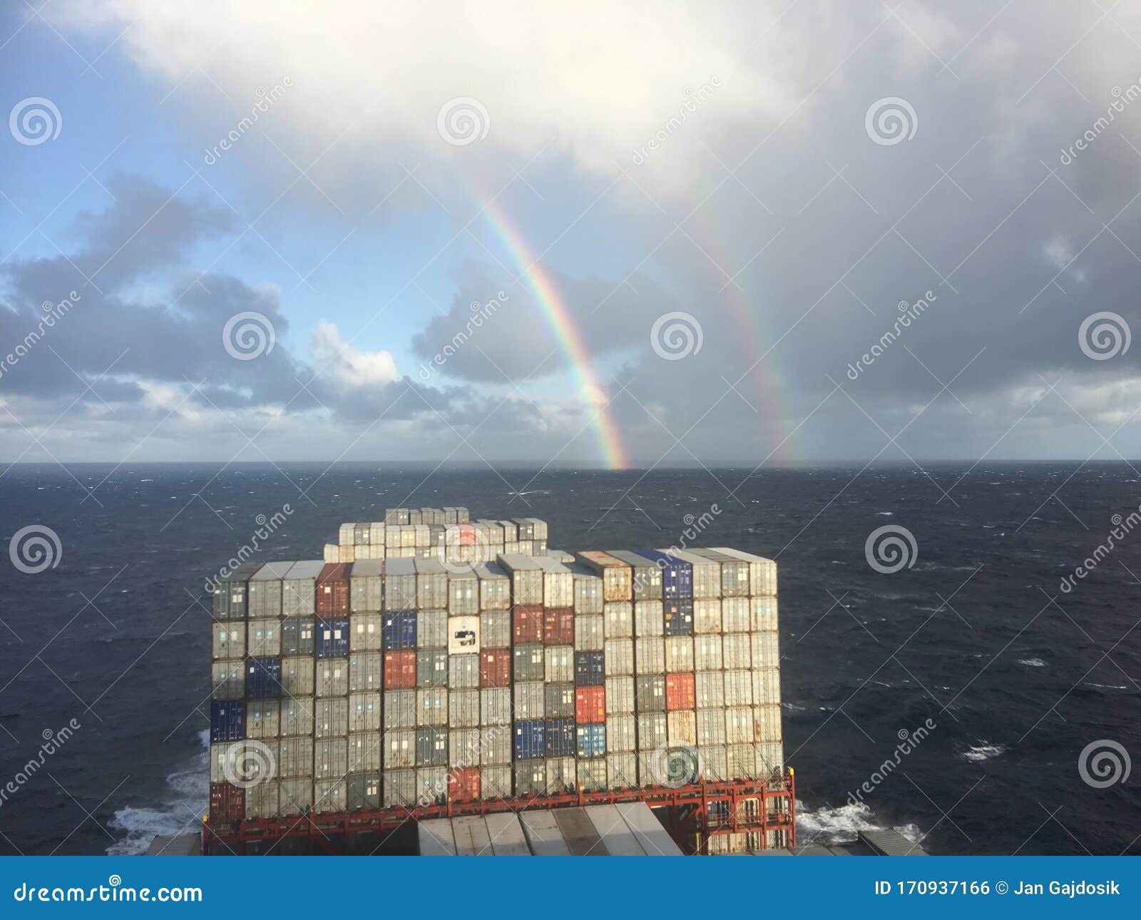 Container Vessel on Atlantic Ocean with Rainbow Stock Photo - Image of ...