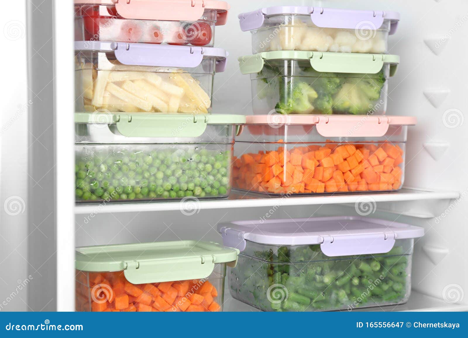 Containers with Different Frozen Vegetables in Refrigerator Stock Image ...