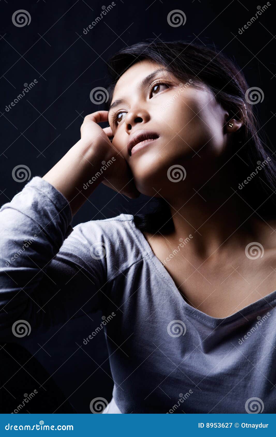 Contemplate woman in dark stock image. Image of looking - 8953627