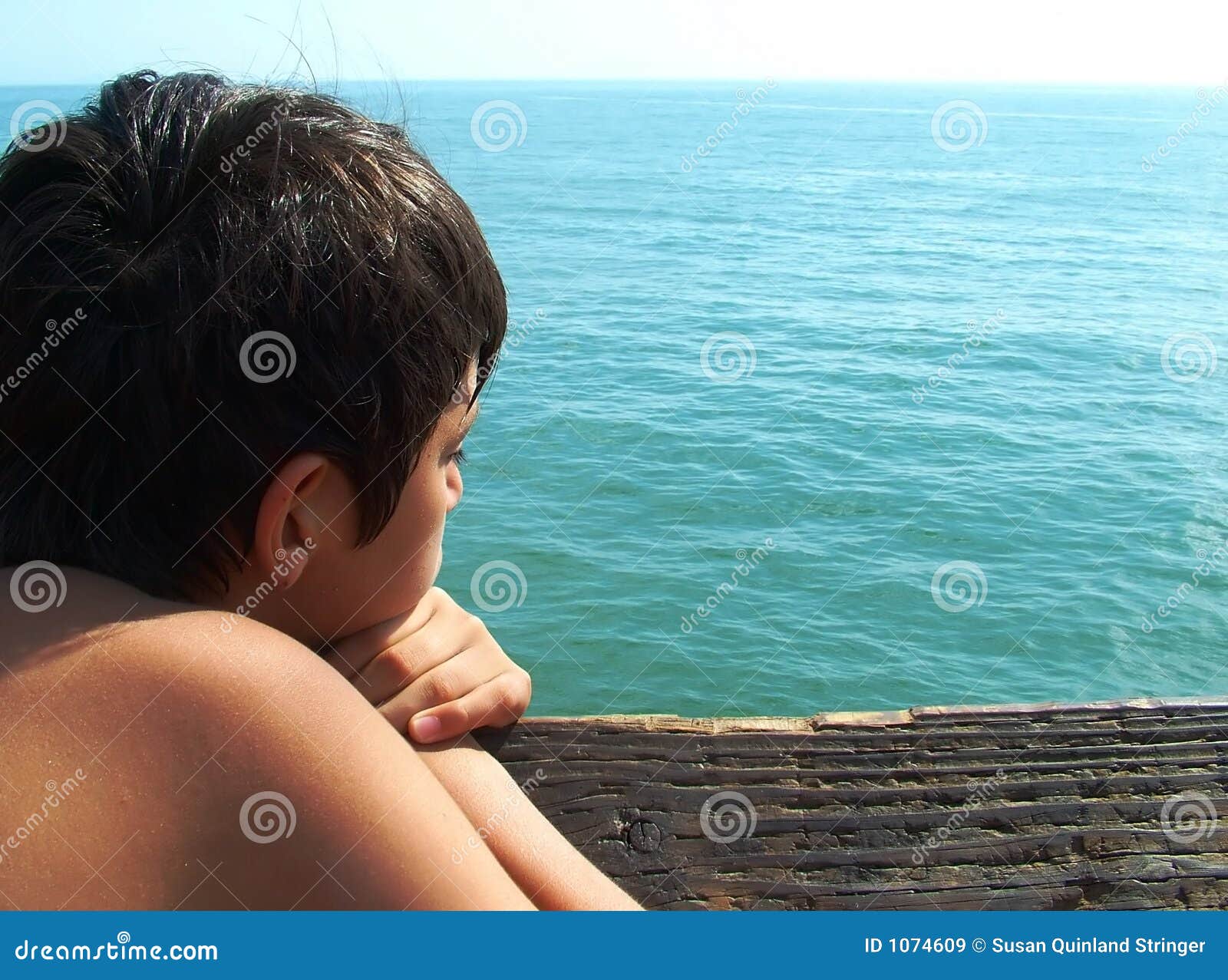 Contemplative Boy stock image. Image of hand, ocean, contemplate - 1074609