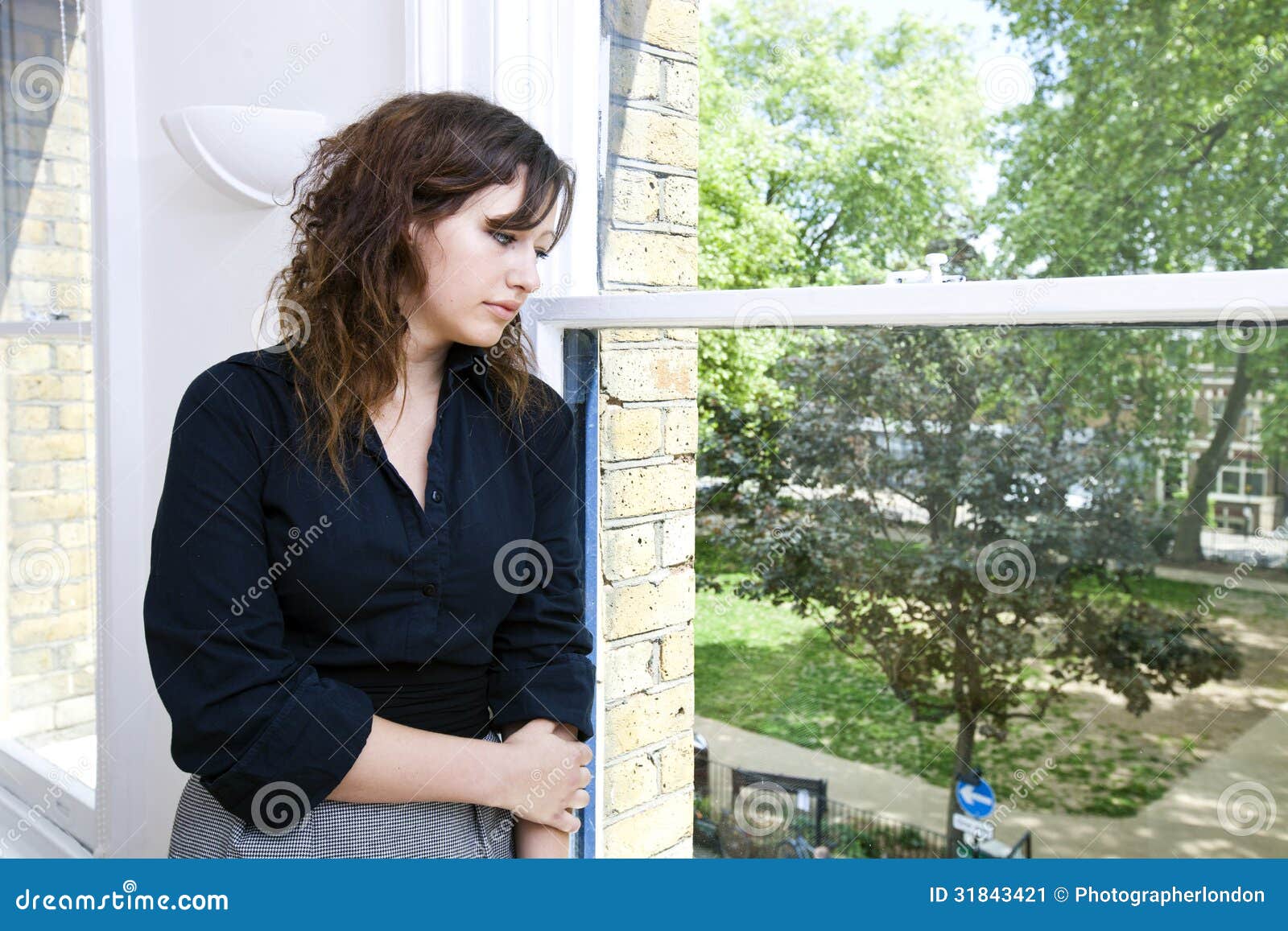 Contemplative Businesswoman Looking Out the Window Stock Image - Image ...