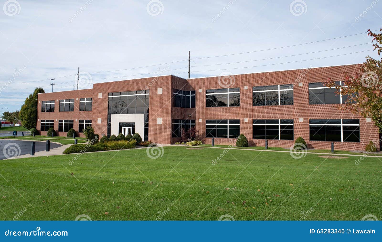 Contemporary Brick Business Building with Lawn Stock Photo - Image of ...