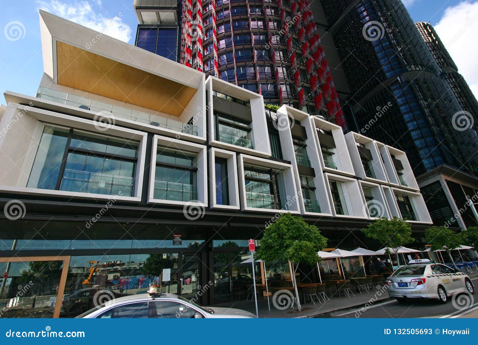 Modern Retail Podium with White Framed and Glazed Facade at Tower Base ...
