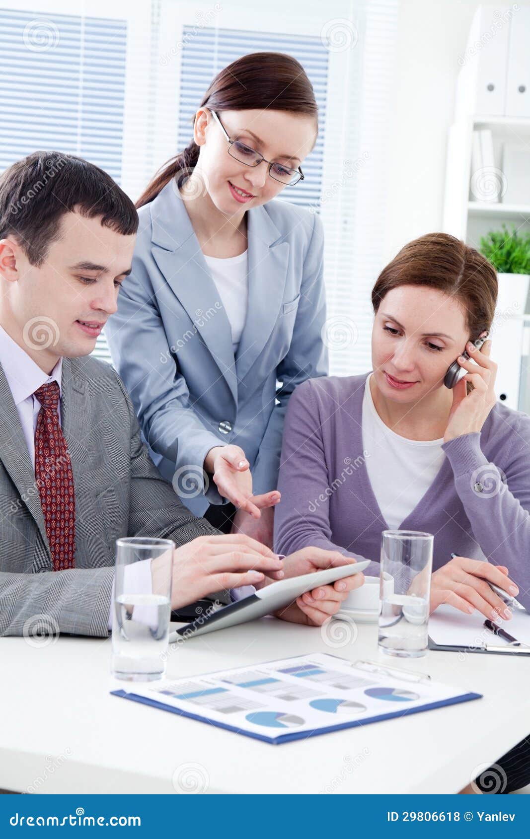 Teamwork in the office stock photo. Image of female, presentation ...