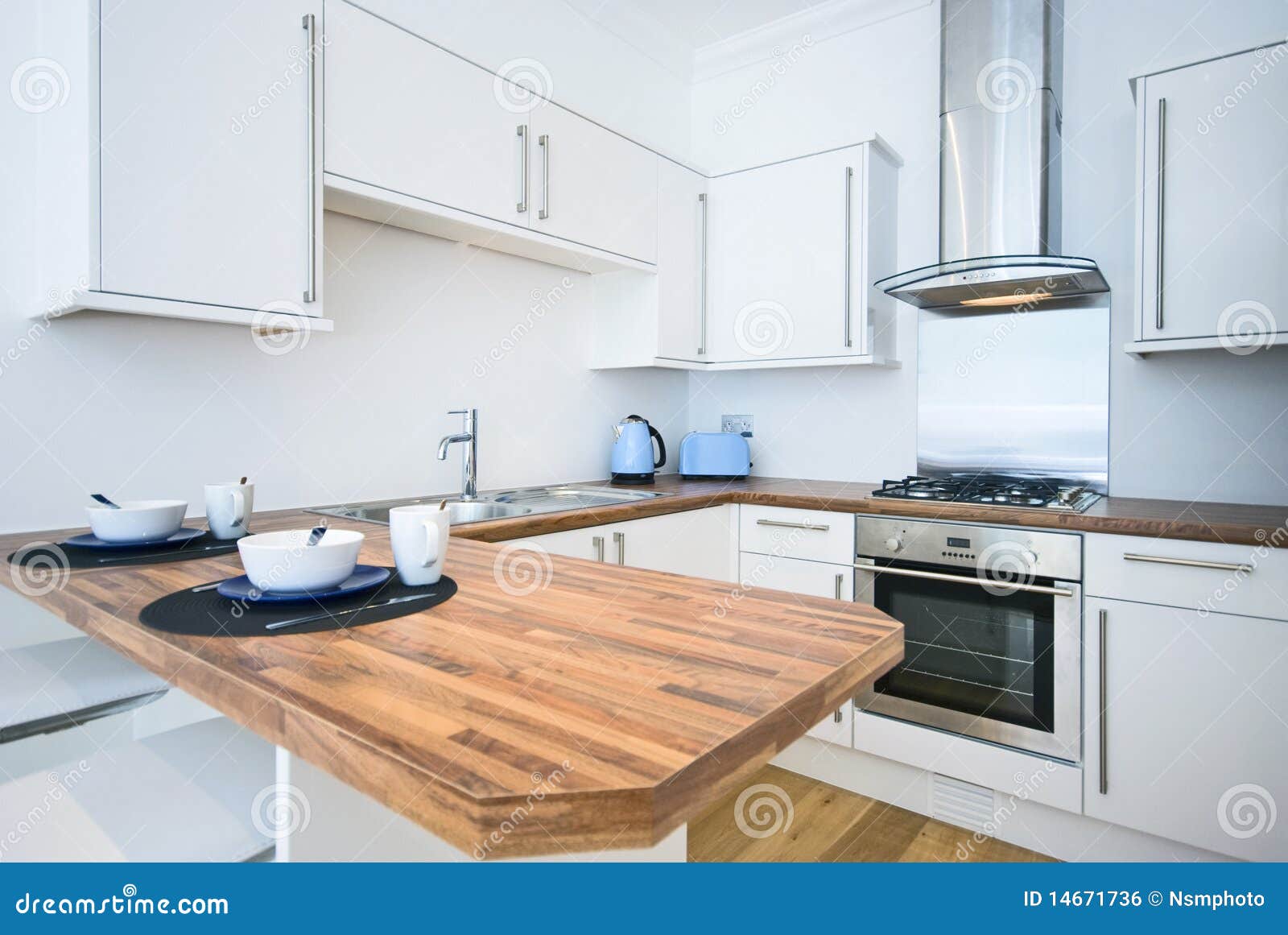 Contemporary Kitchen with a Breakfast Bar Stock Photo - Image of ...
