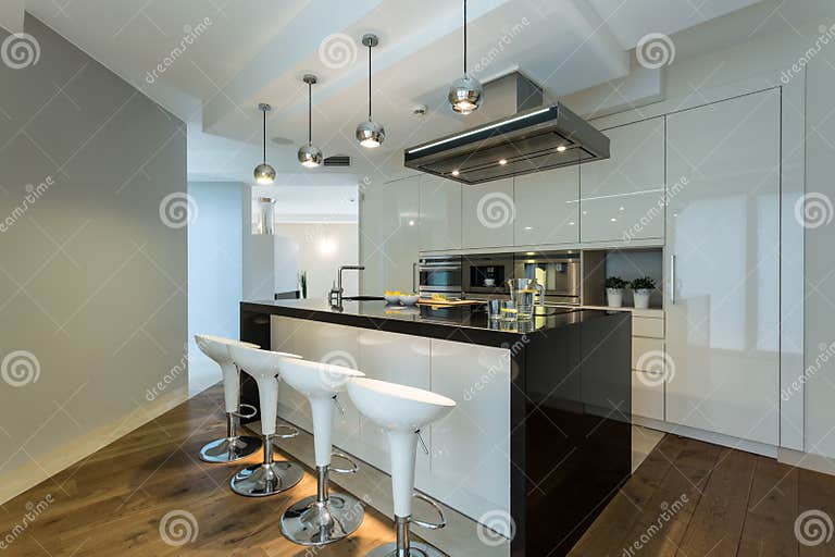 Contemporary Kitchen with Designer Chairs Stock Image - Image of inside ...